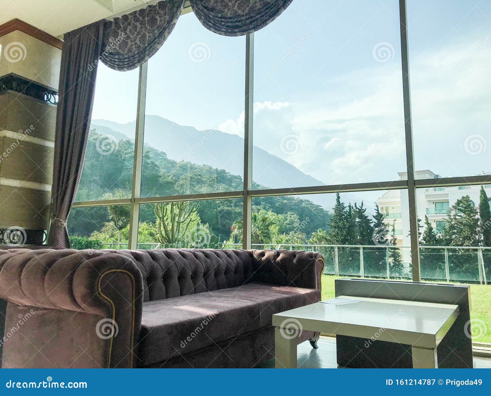 View on a Mountains through the Window. Stock Image - Image of clouds ...