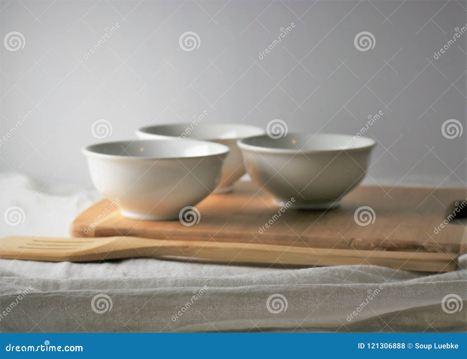 Modern Cooking Simple Clean with Bamboo Cutting Board and Spatula Stock ...