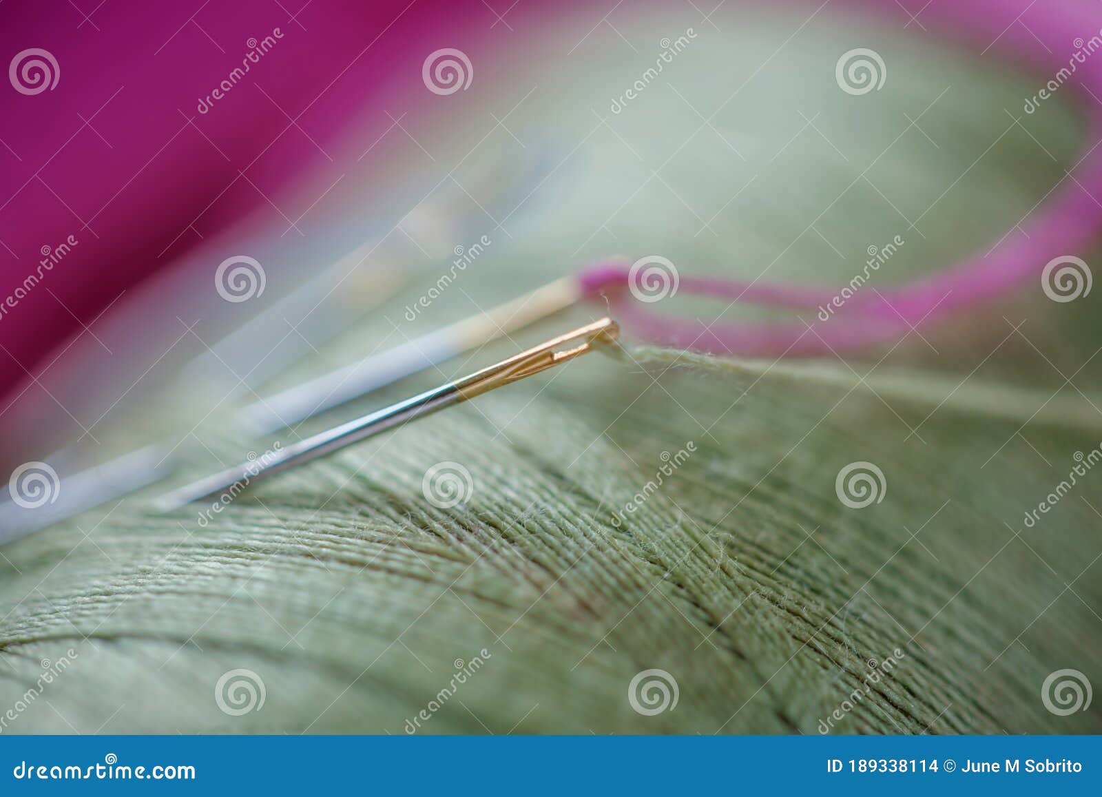 Closeup View of Vintage Sewing Needles on a Spool of Thread Stock Photo ...