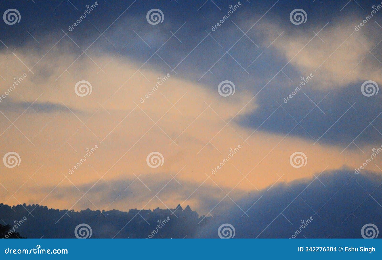 On a Very Cloudy Evening in a Small Silent Hill Town. Stock Photo ...