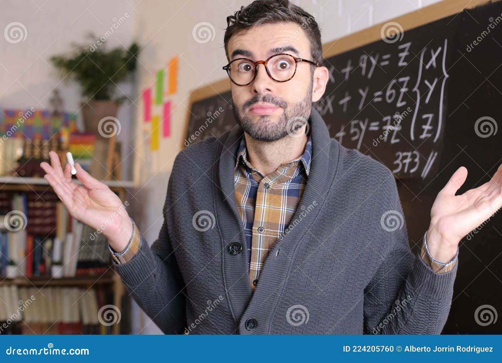 Very Confused Teacher in Classroom Stock Photo - Image of confused ...