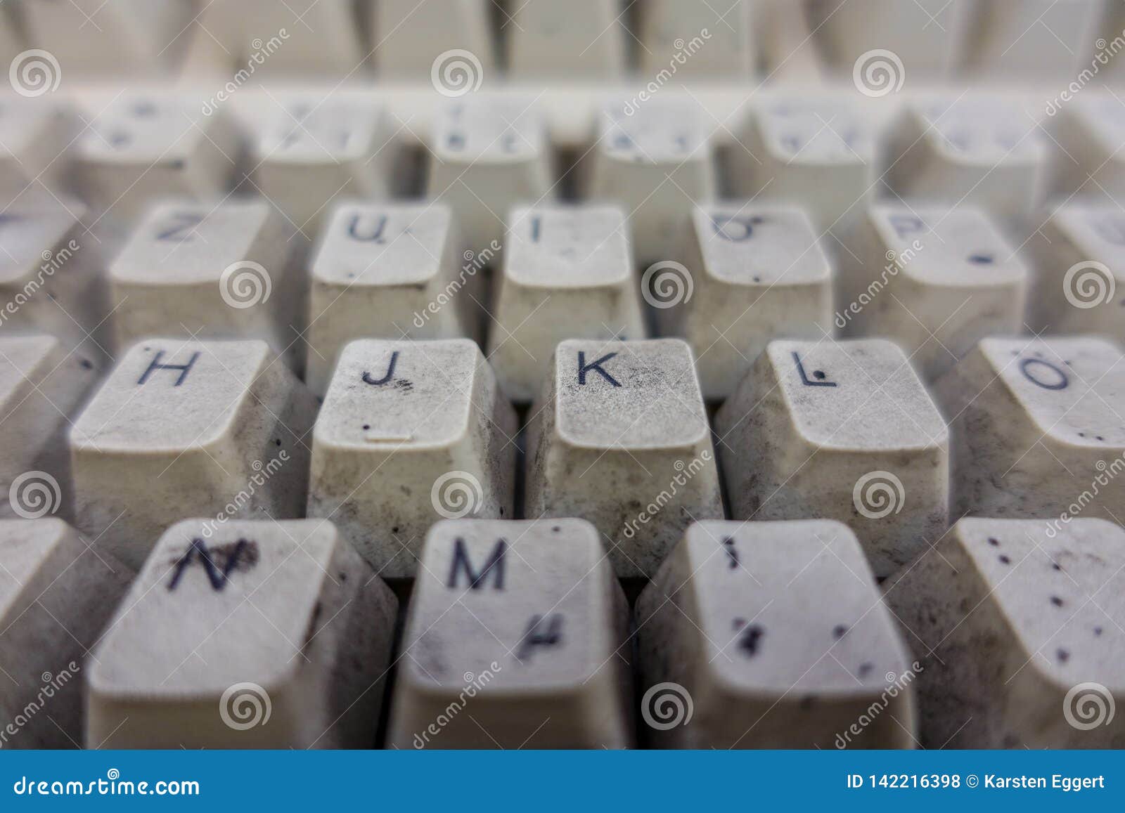 A Completely Dirty White Computer Keyboard in a Workshop Stock Photo ...