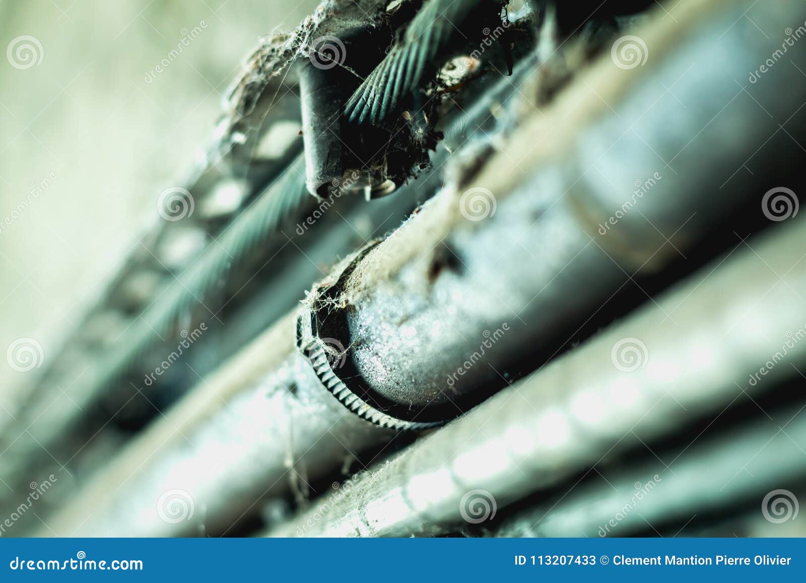 An Old, Dirty Electrical Cable Wire In The Brick Wall Of The Facade Of ...