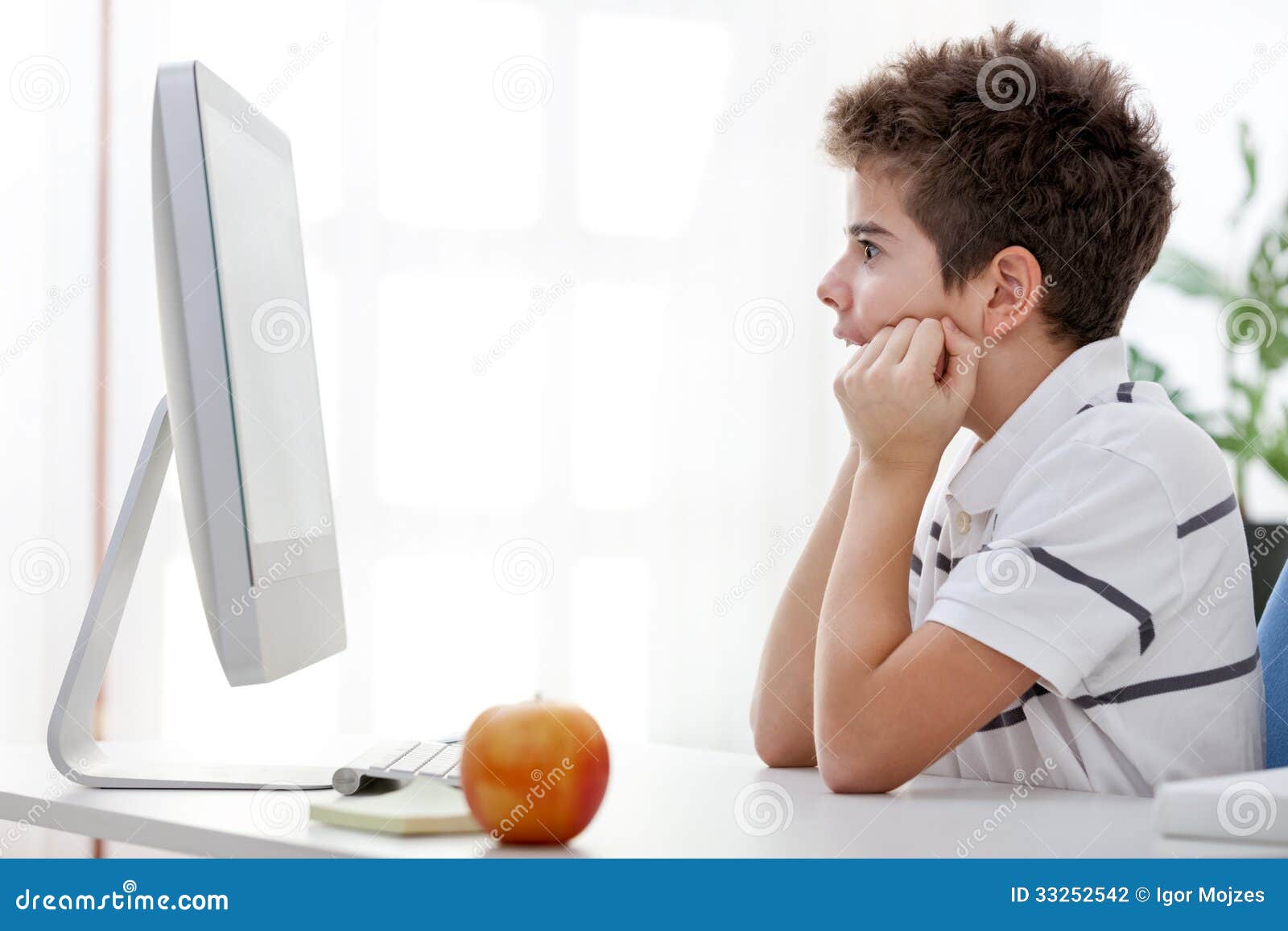 Very Focused Boy Looking at Computer Screen Stock Photo - Image of ...