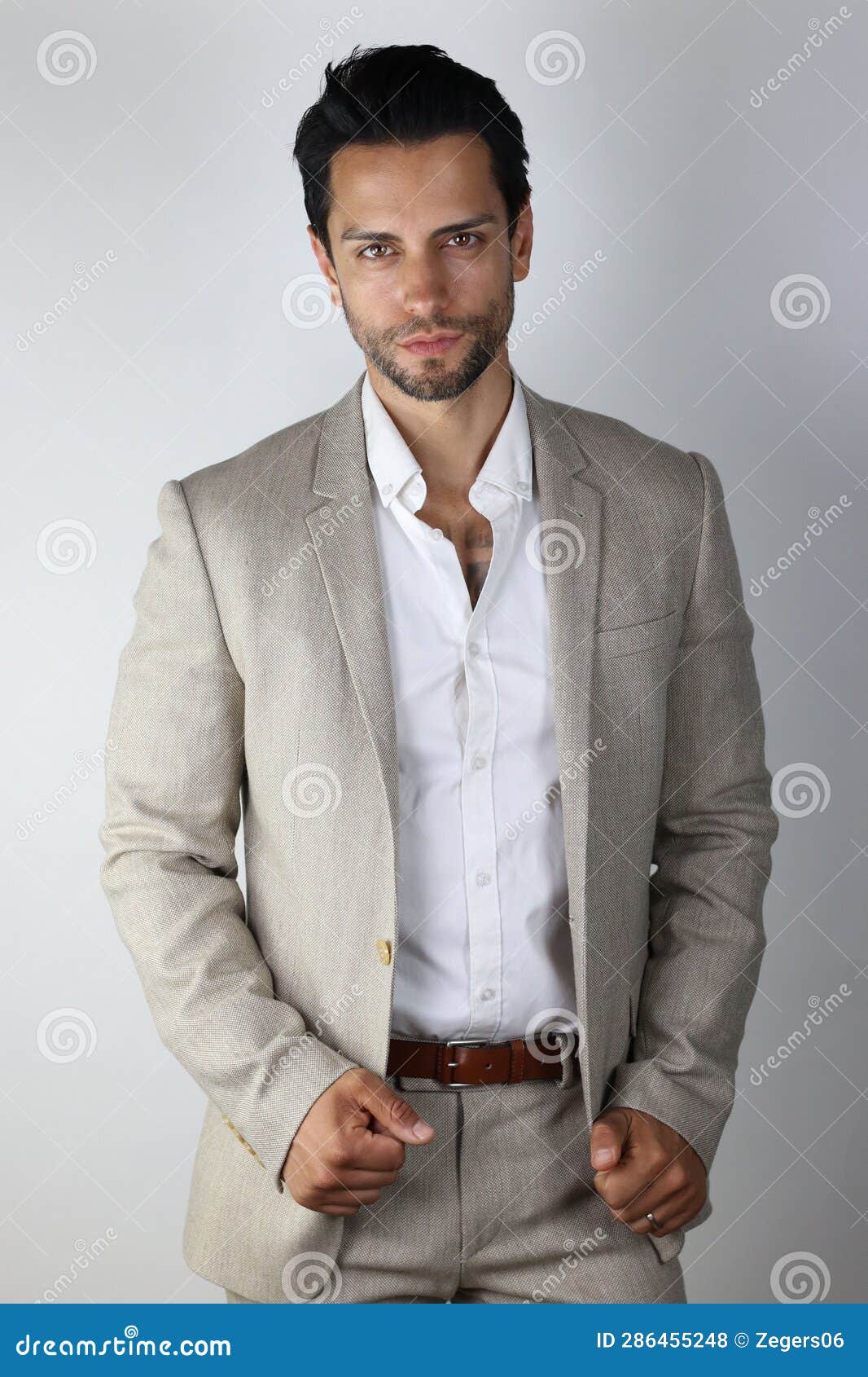 Very Good Looking Man Wears a Beige Suit Stock Photo - Image of elegant ...