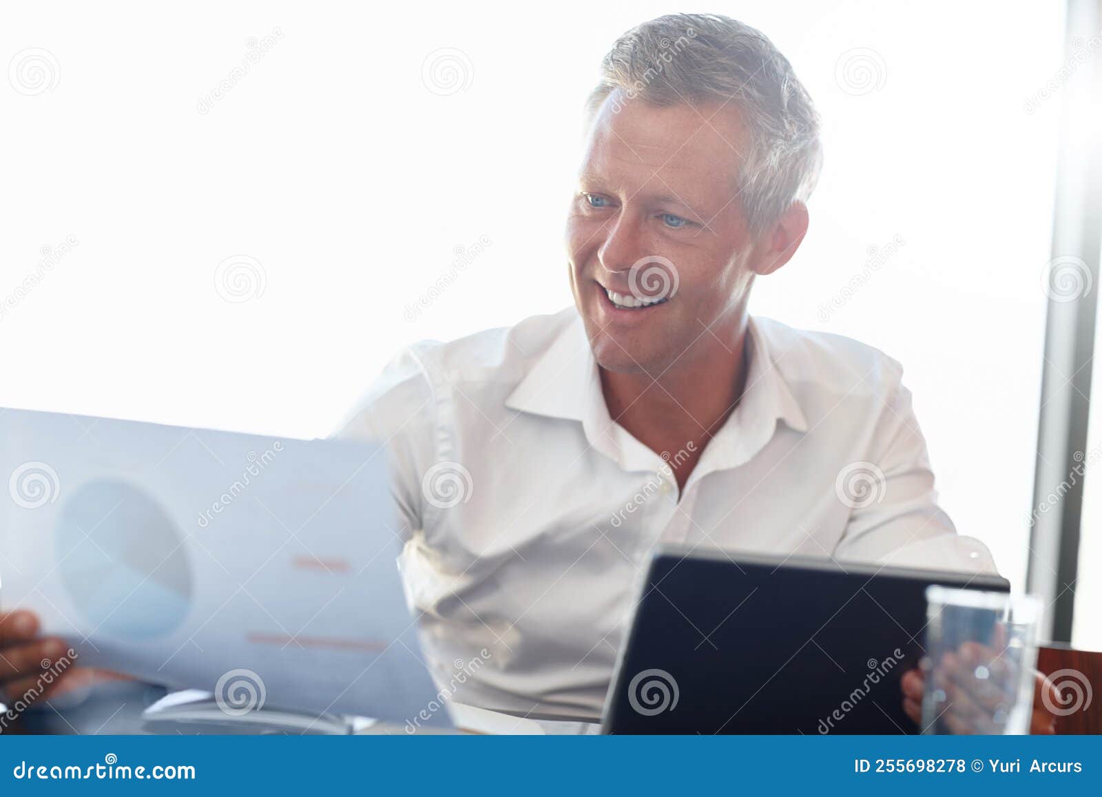 Very Impressive. a Handsome Businessman in the Office. Stock Photo ...