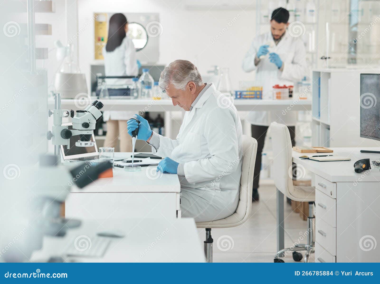 This is a Very Intricate Process To Follow. a Mature Scientist Working ...