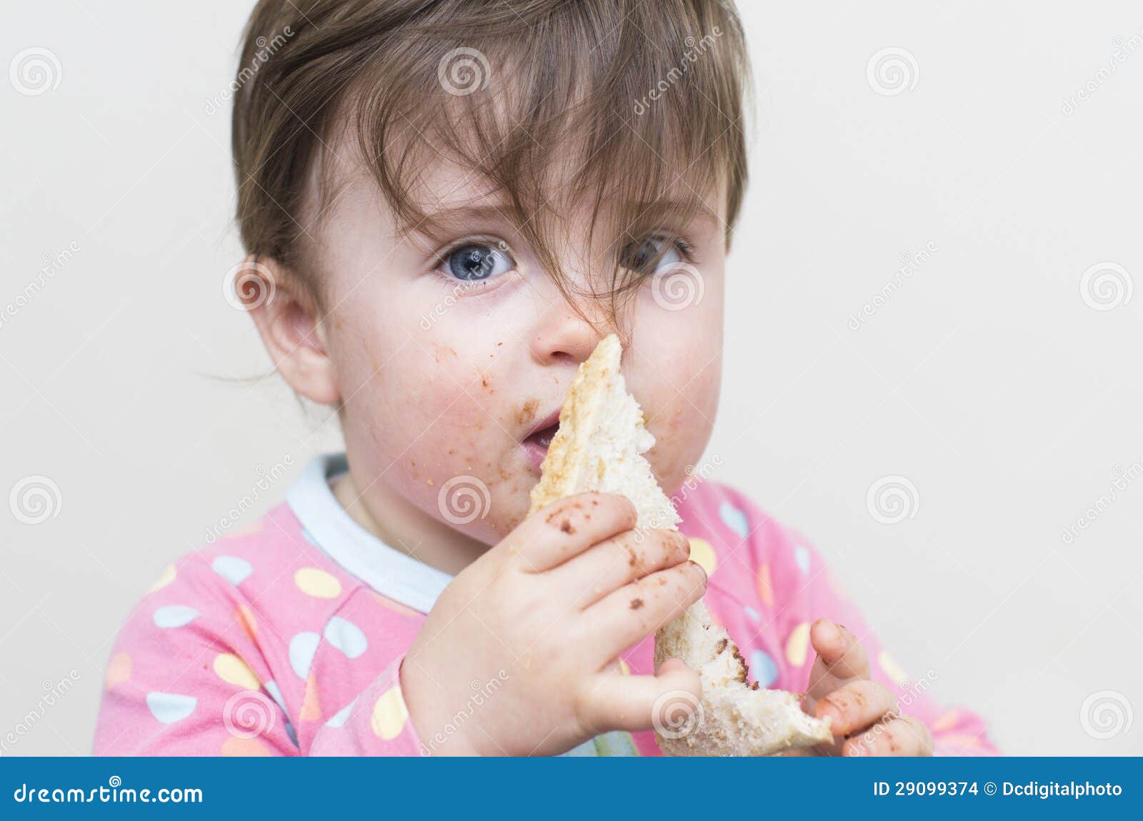 Very Messy Girl Eating a Sandwich Stock Photo - Image of little ...