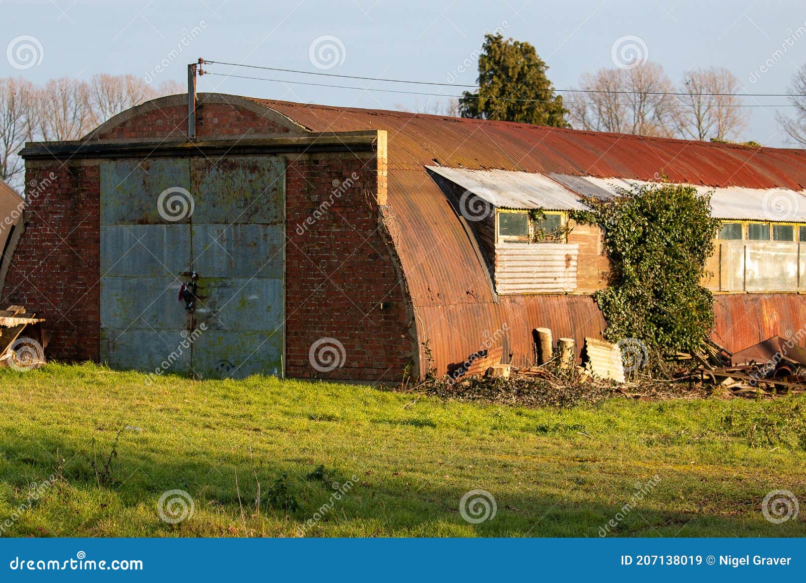 Old red dutch barn stock image. Image of farmhouse, roof - 207138019