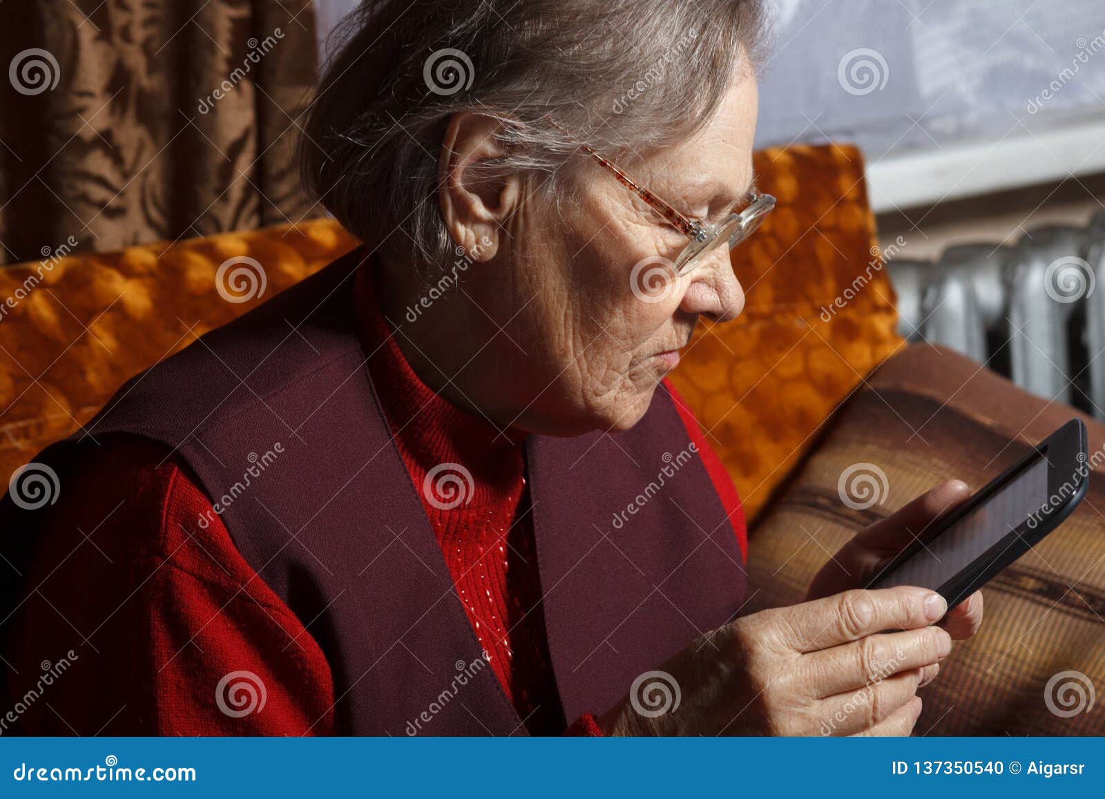 Old Woman Using Ebook Reader Stock Photo - Image of aged, pensioner ...