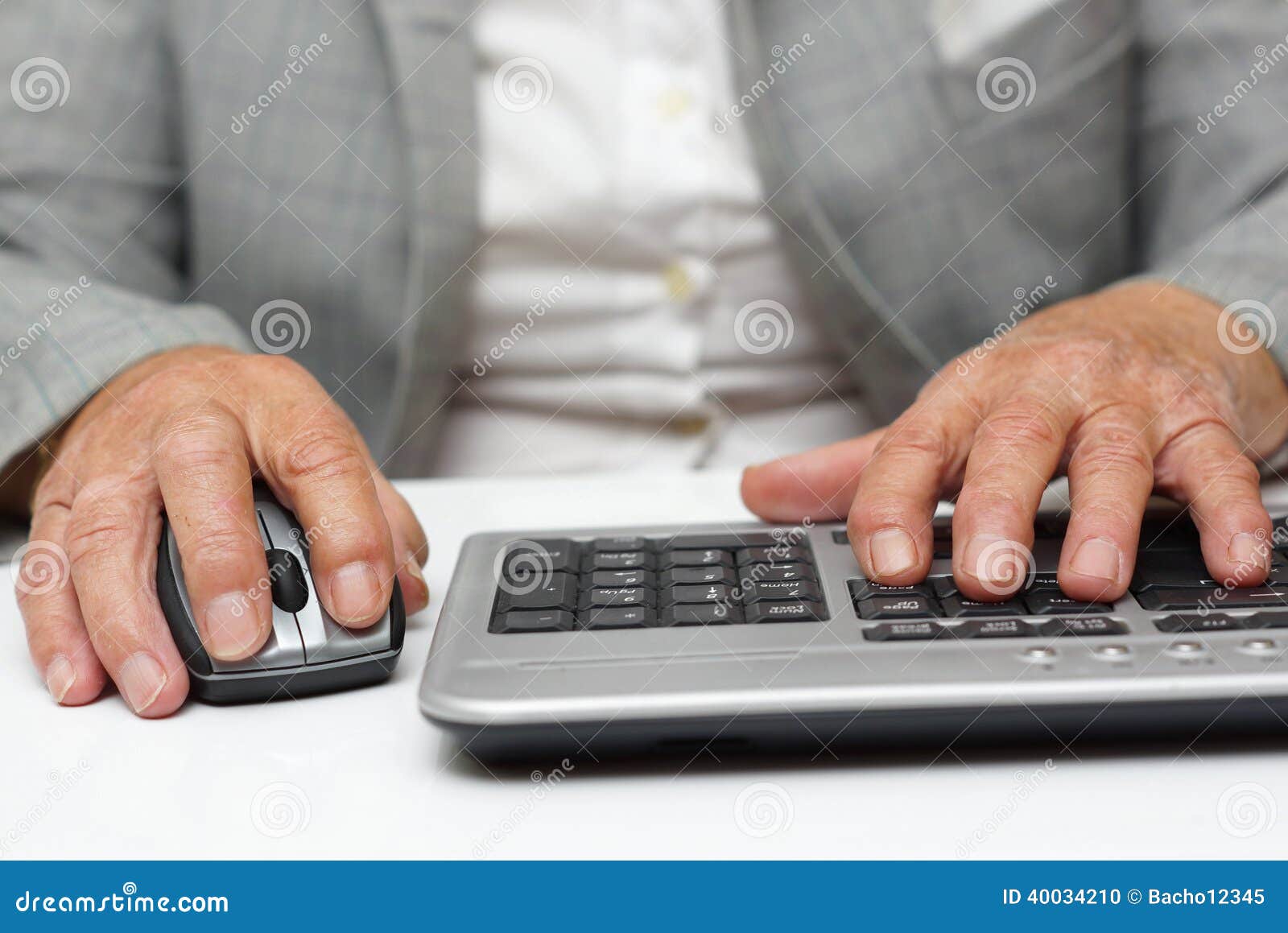 Very Old Woman Typing on Keyboard and Using Mouse Stock Photo - Image ...