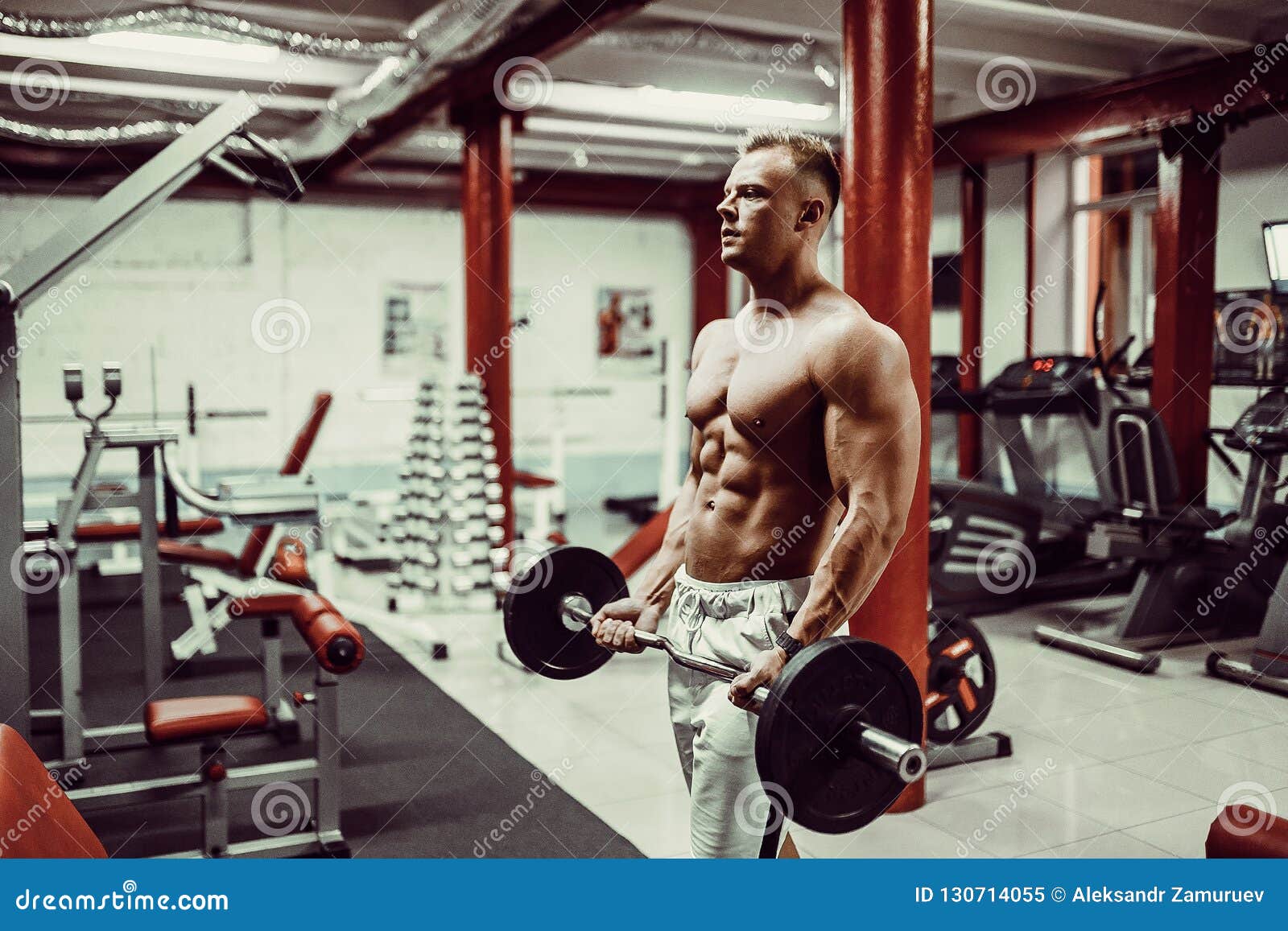 Very Power Athletic Guy Bodybuilder , Execute Exercise with Dumbbells ...