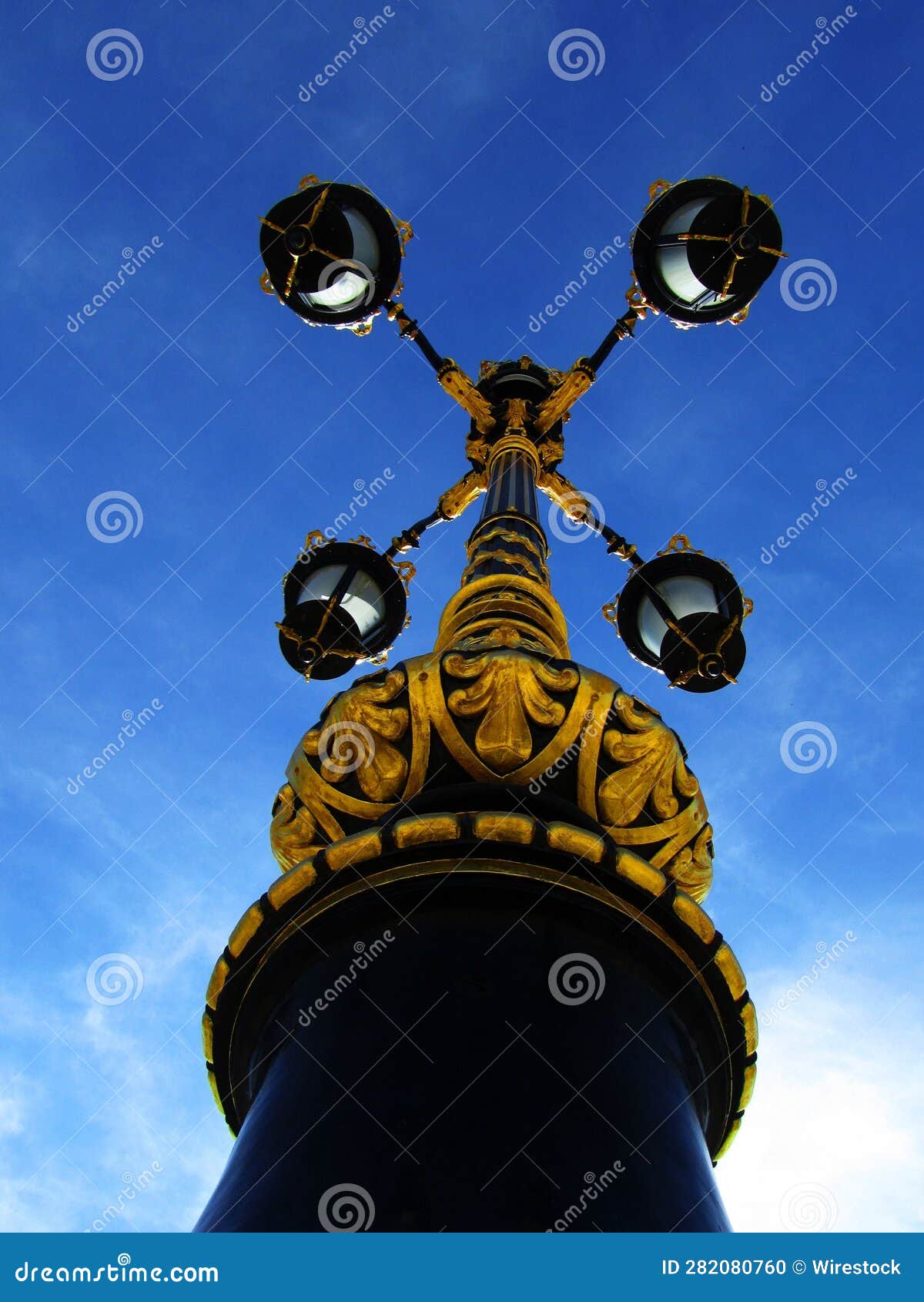 A Very Pretty Light Pole that is in the Sky between Two Other ...