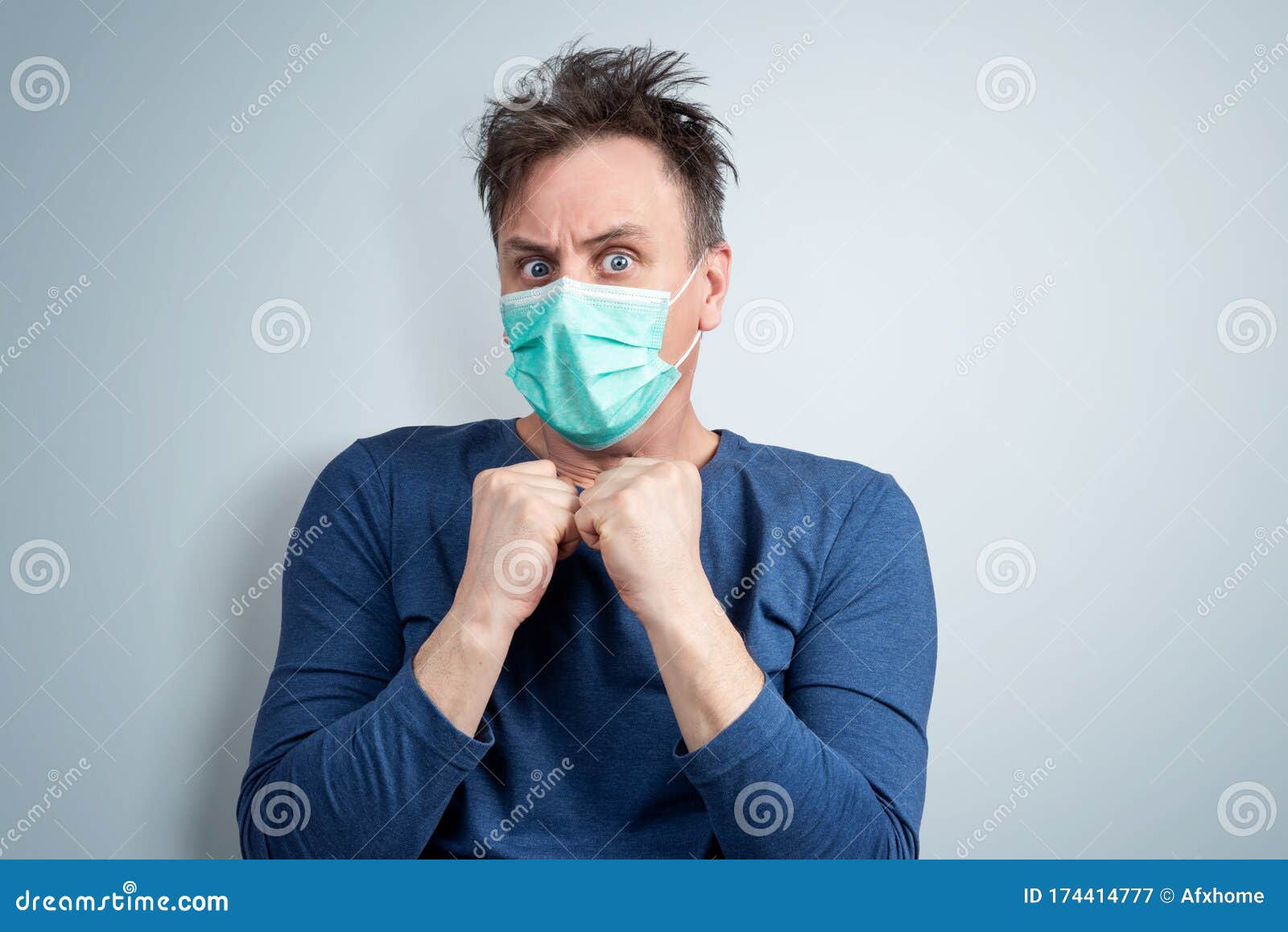 Very Scared Man in a Respiratory Mask is Afraid of Contracting a Virus ...