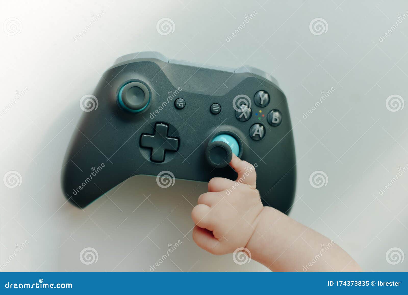 A Very Small Child Plays with the Joystick Stock Image - Image of plays ...