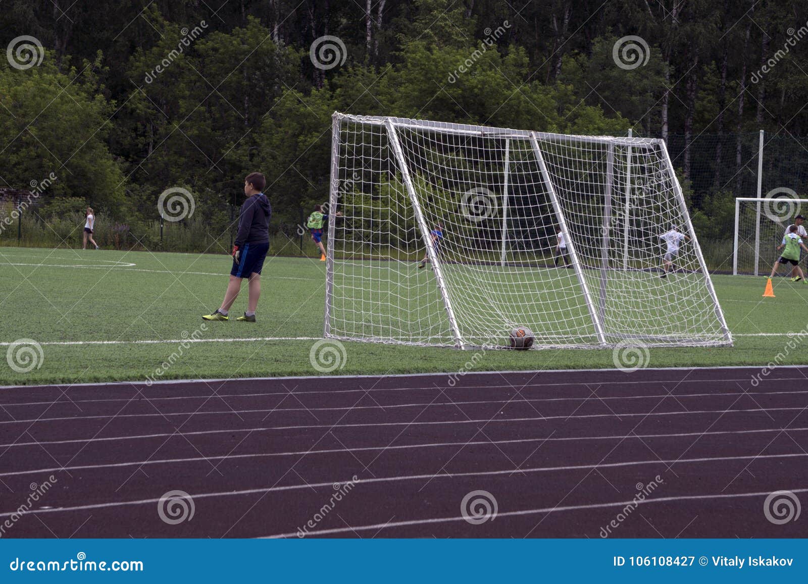 The Dark One a Very Small Footballer Editorial Photography - Image of ...