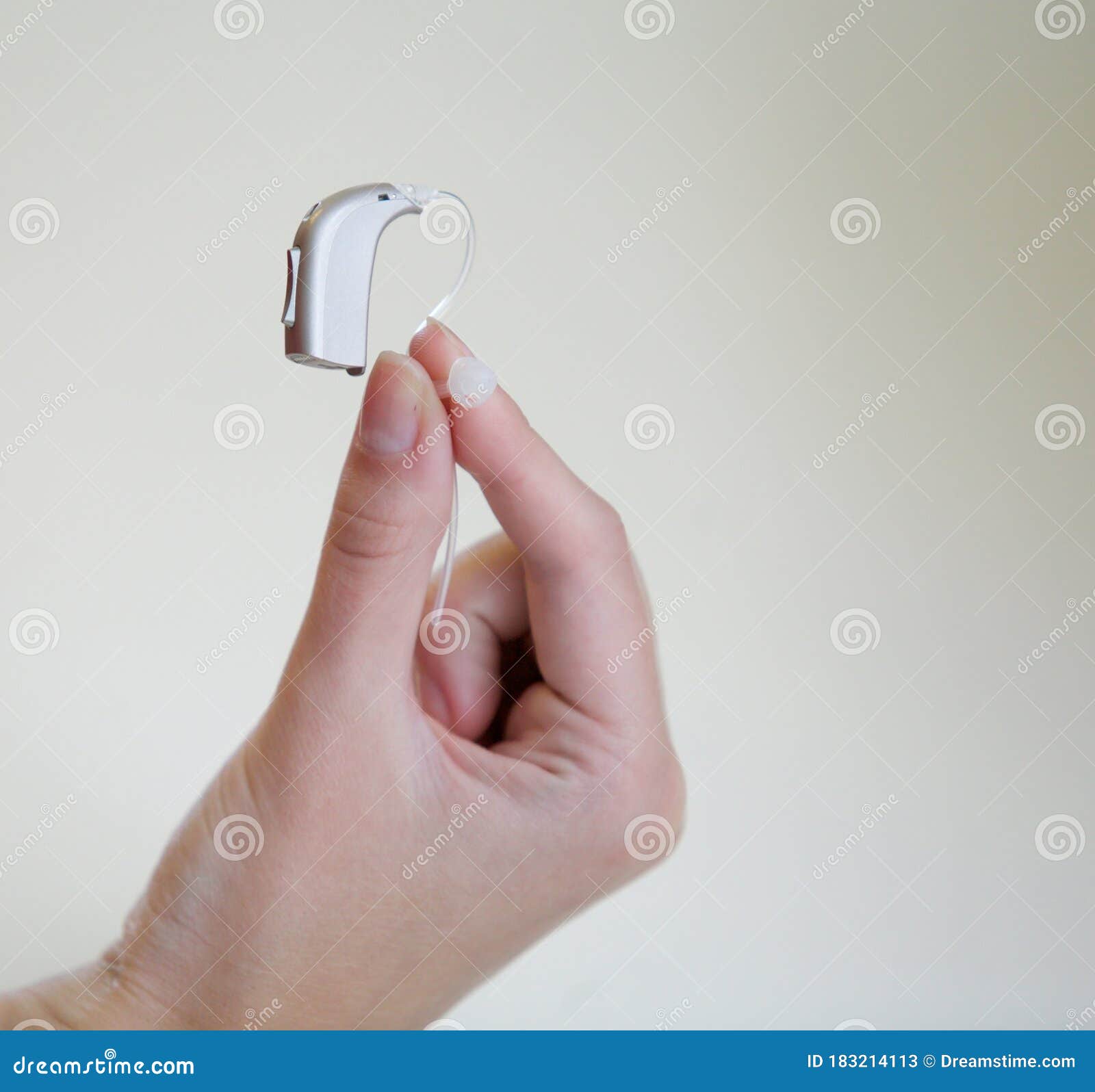 Very small hearing aid stock image. Image of closeup - 183214113