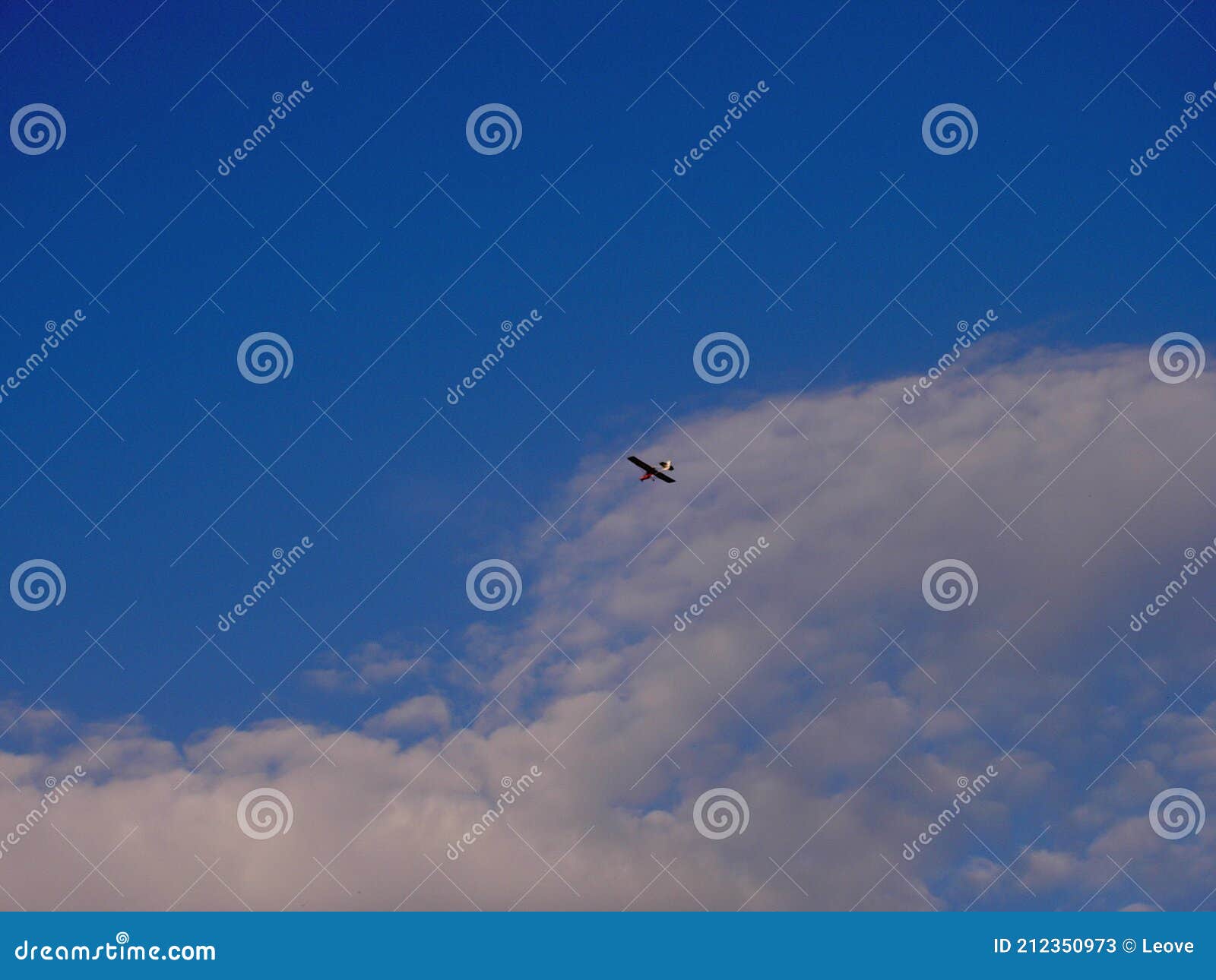 Very Small and Light Propeller Plane Flying at High Altitude, in the ...