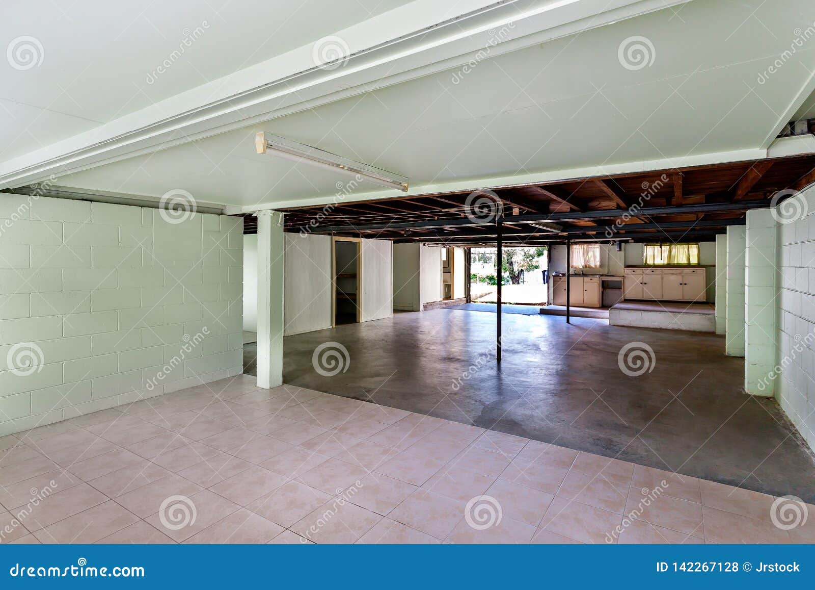 Very spacious garage stock photo. Image of living, long - 142267128