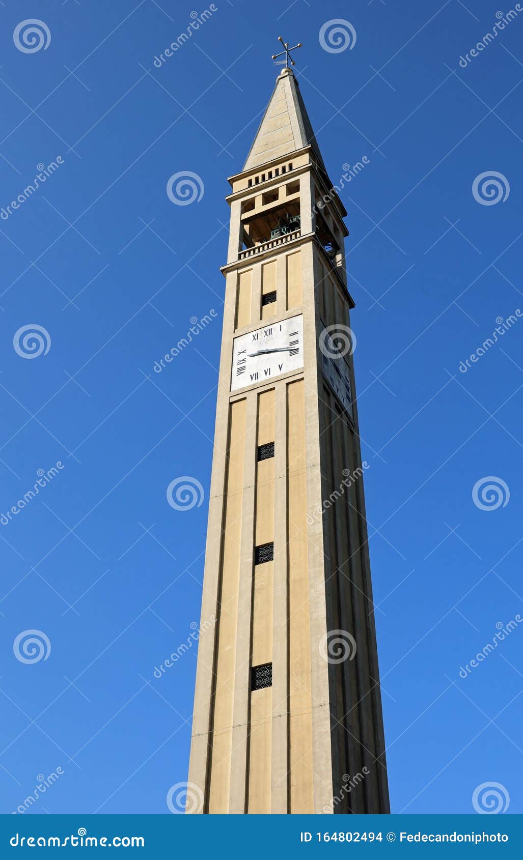 Very Tall Bell Tower with Pyramidal Spire with a Square Base and Stock ...