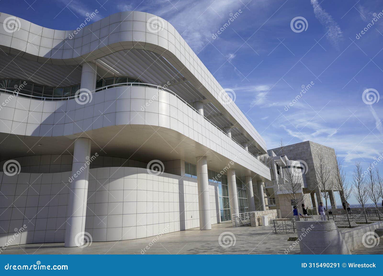 A Very Tall Building that Has a Circular Walkway Around it Editorial ...