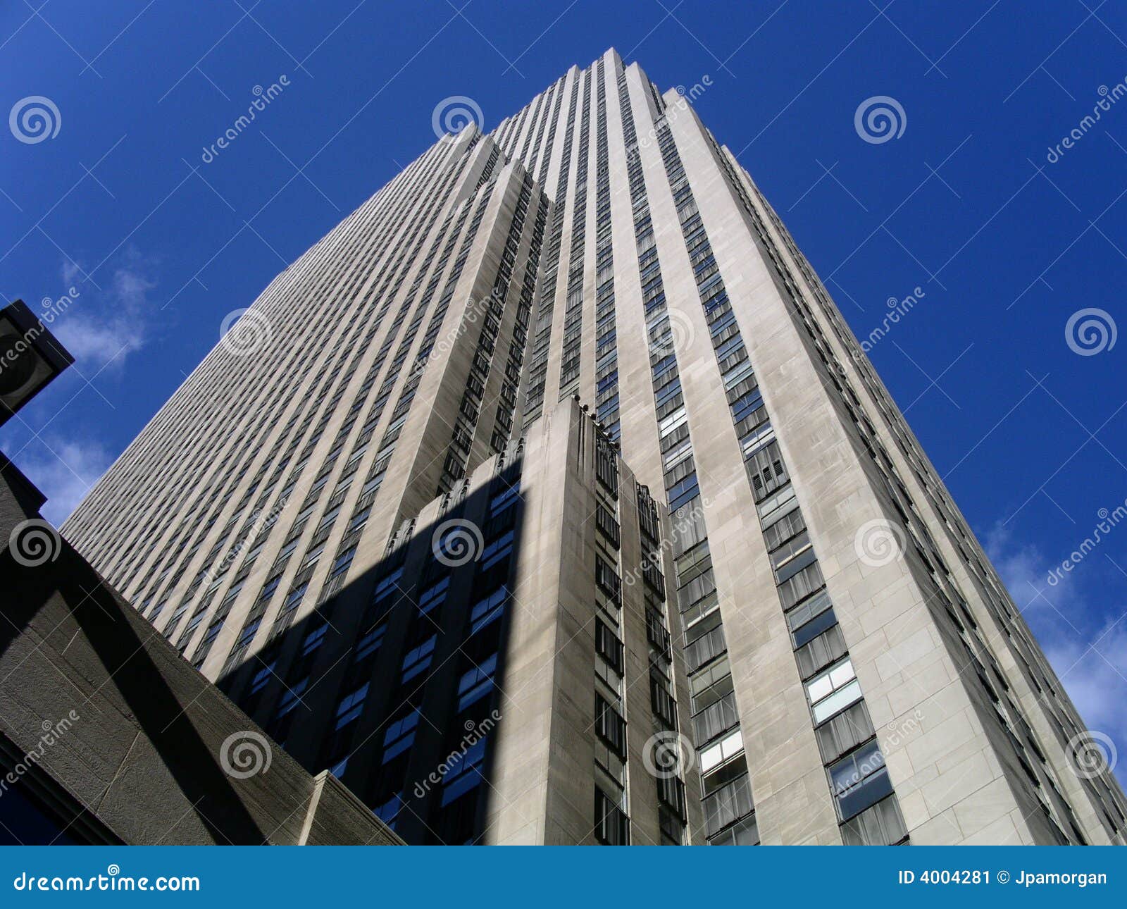 A Very Tall Building/Skyscaper Stock Image - Image of clouds, window ...