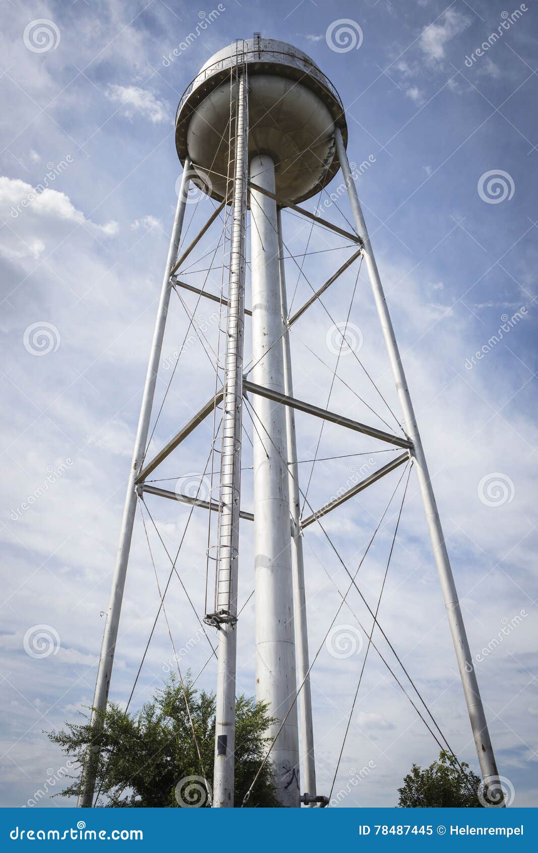 Very Tall Water Tower Under Blue Skies. Stock Image - Image of tank ...