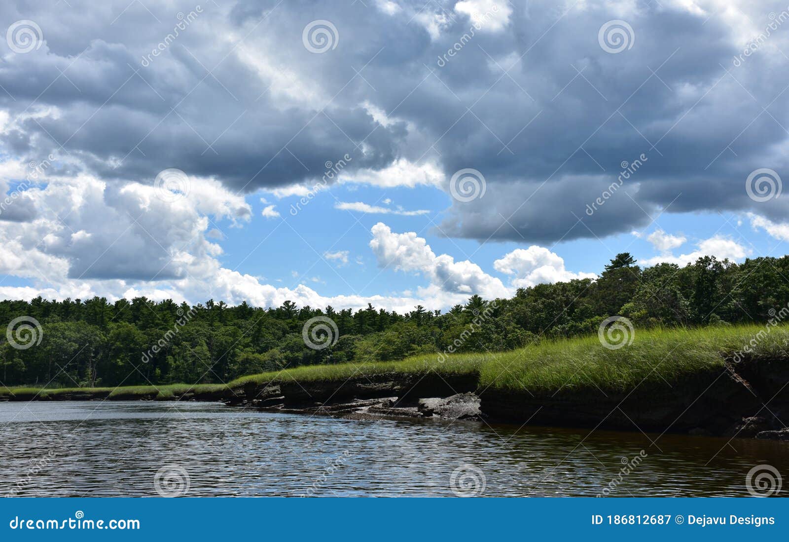 Very Thick Clouds Over a Tidal Marsh Land Stock Image - Image of ...