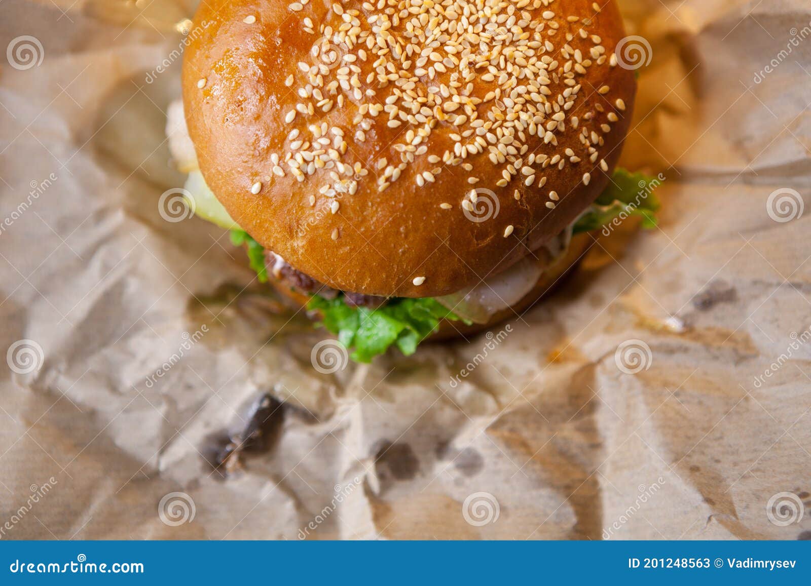 Very Ugly Cheeseburger with Bacon on Baking Paper Stock Image - Image ...