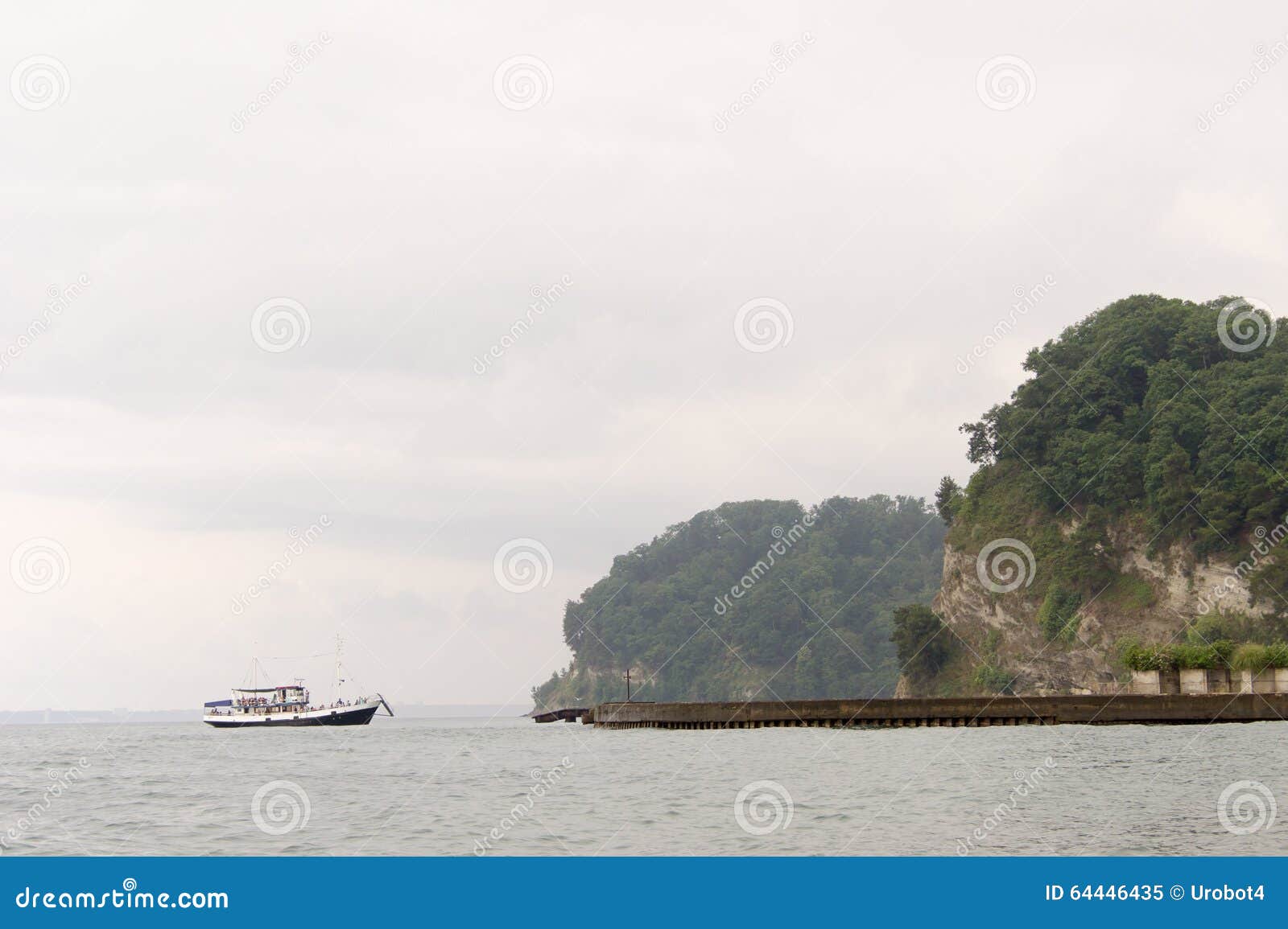 Vessel in Bay stock image. Image of cliff, mountain, beach - 64446435
