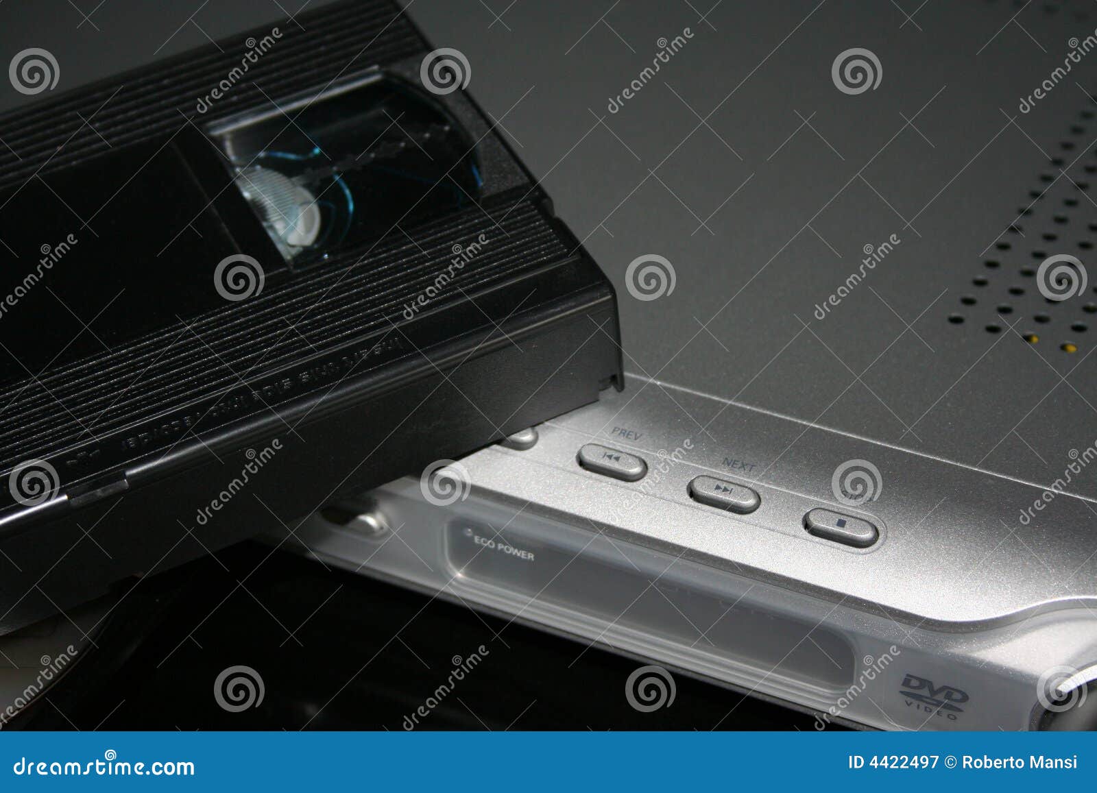 VHS On A Silver DVD Player Picture. Image: 4422497