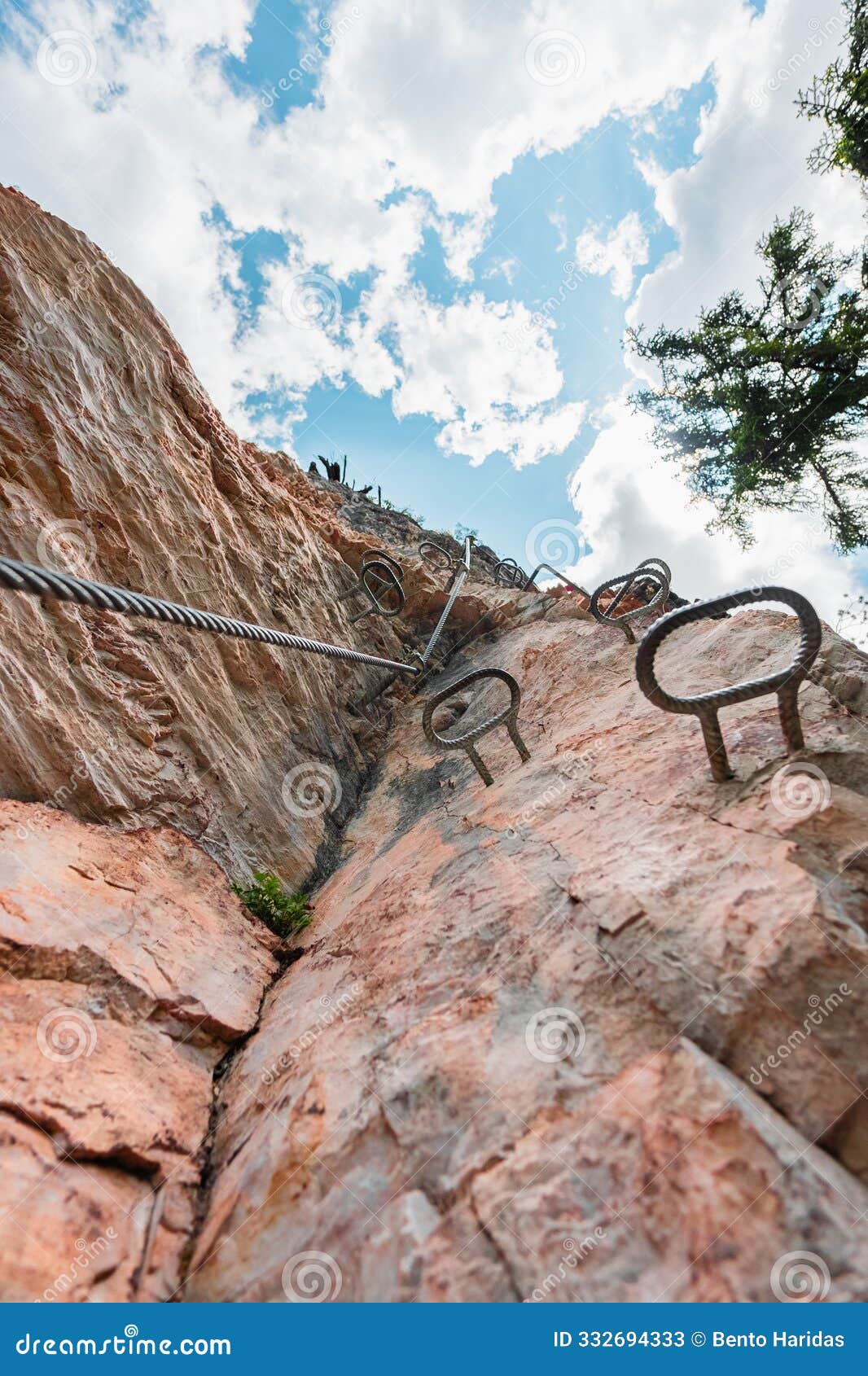 Via Ferrata Climbing Path with Metal Wire and Steps Going Up a Mountain ...