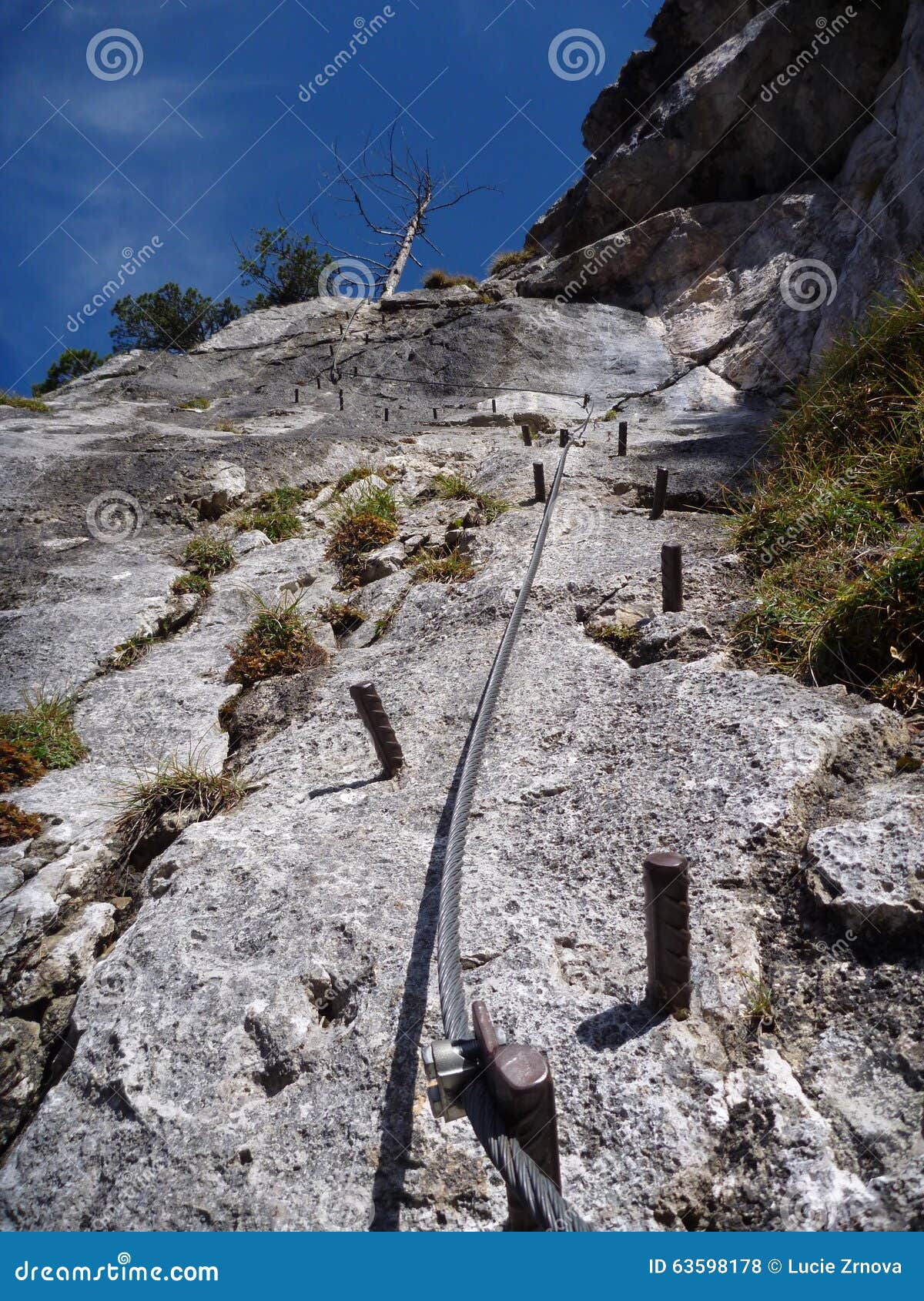 Via Ferrata Steel Rope On A Rock Detail. Steel Chrome Anchor Stock ...