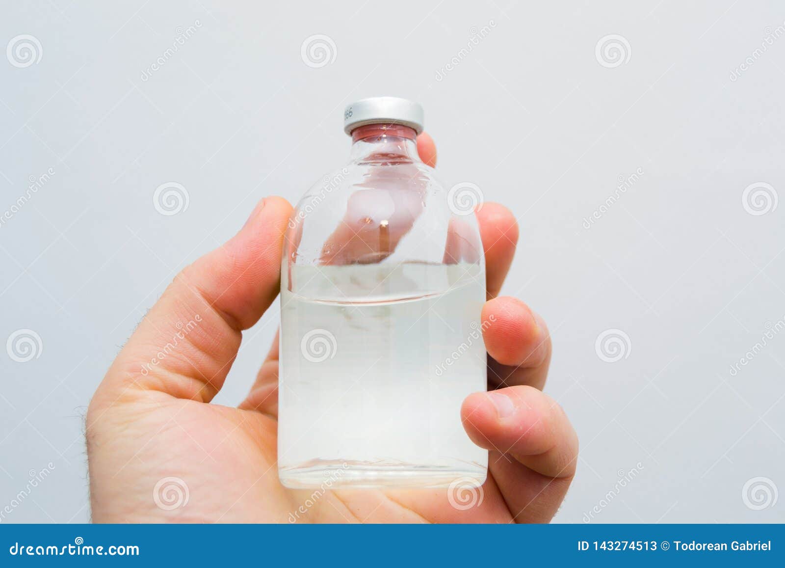 Vial with Transparent Drug Solution in a Man`s Hand Stock Image - Image ...