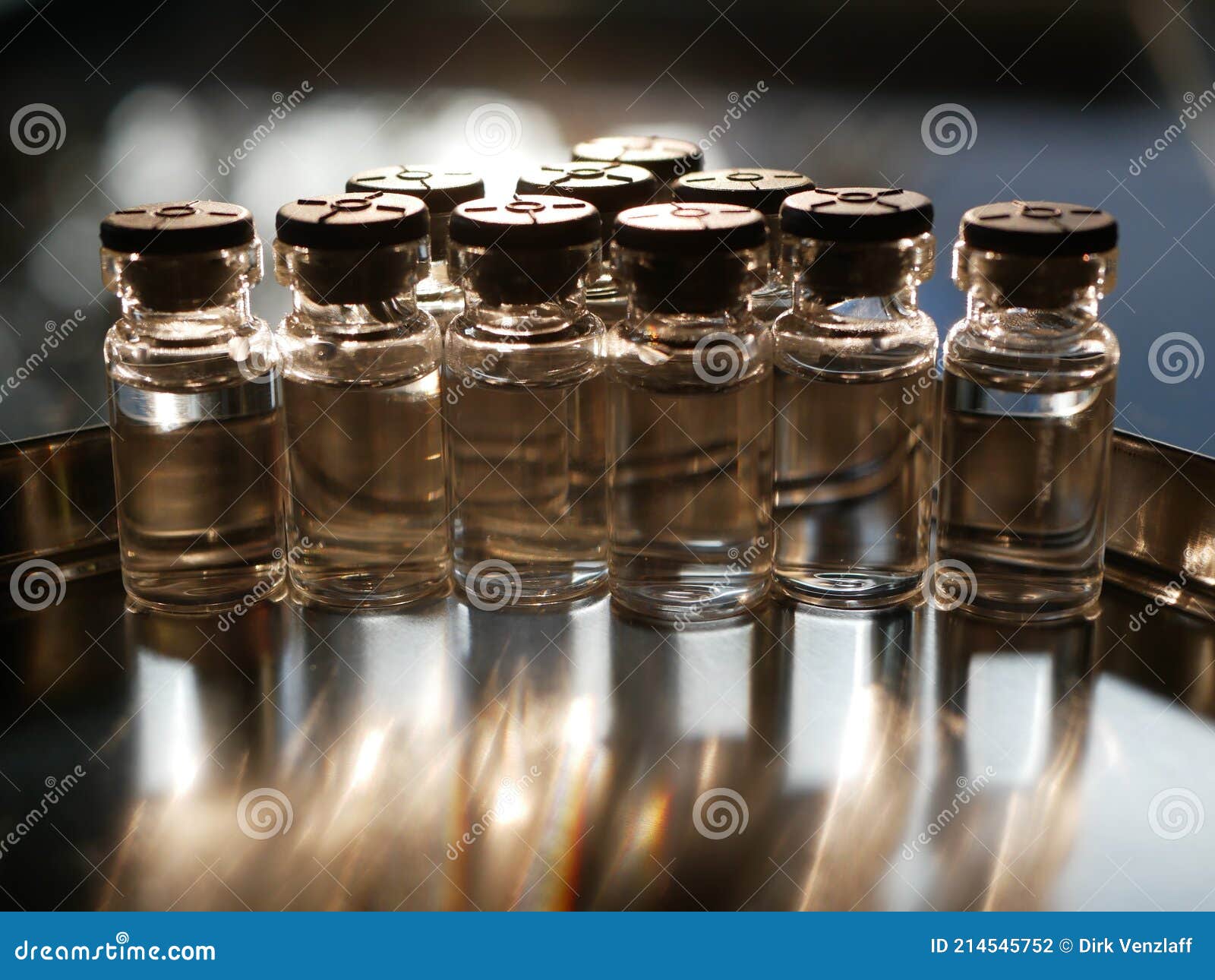 Ten Vials in a Triangle, Light from the Back, Reflections on the ...