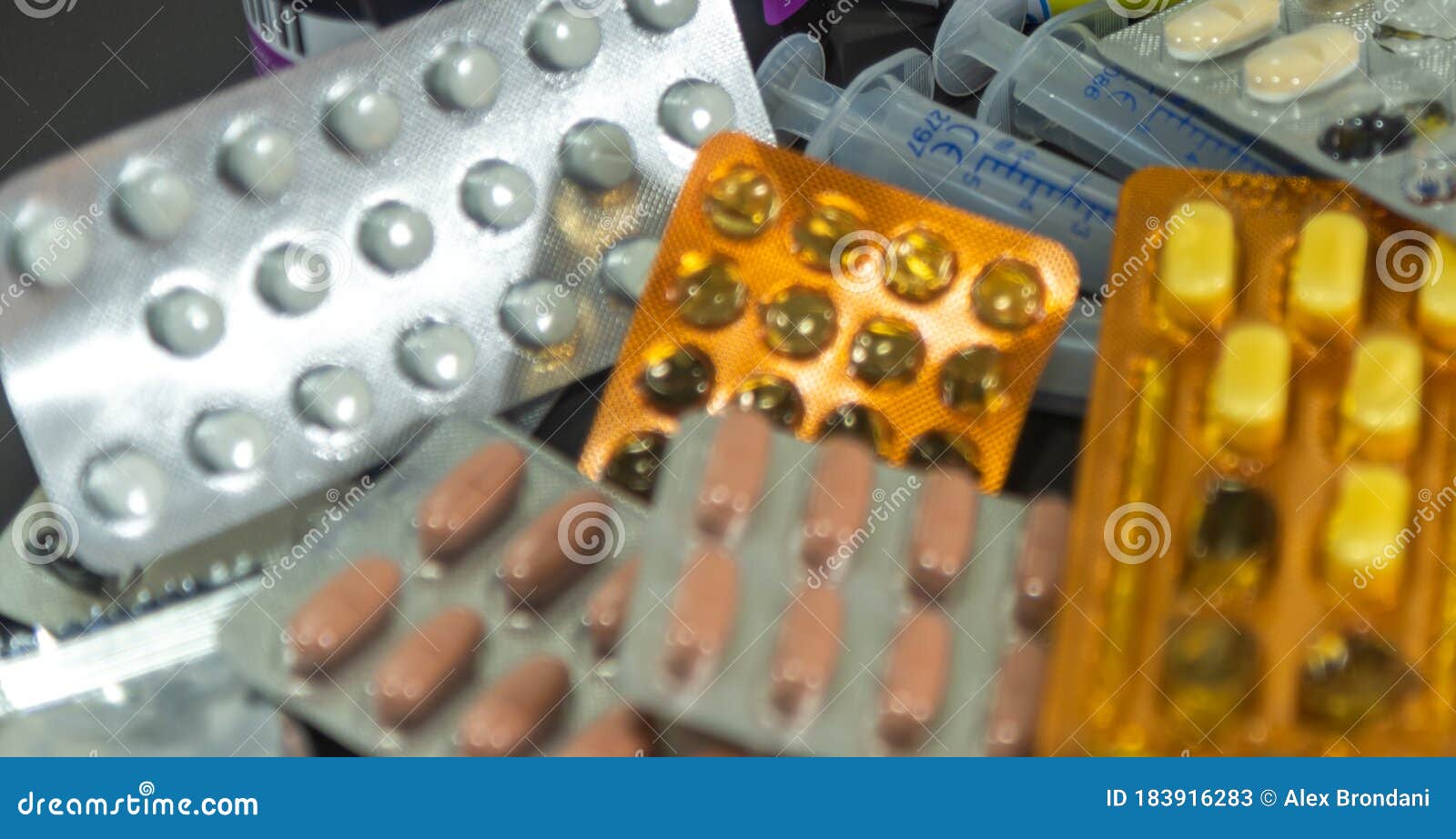 Vials and Pills for Human Health Treatment Randomly Scattered on a Dark ...