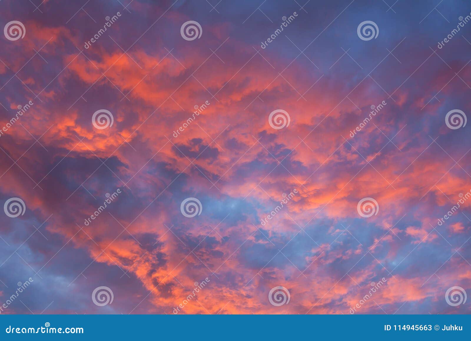 Vibrant clouds at sunset stock image. Image of scenic - 114945663