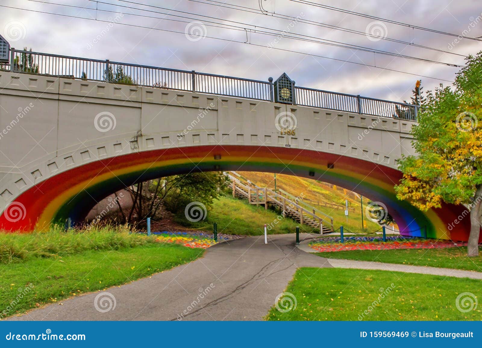 Vibrant Cloudscape Over the Rainbow Bridge Stock Image - Image of ...