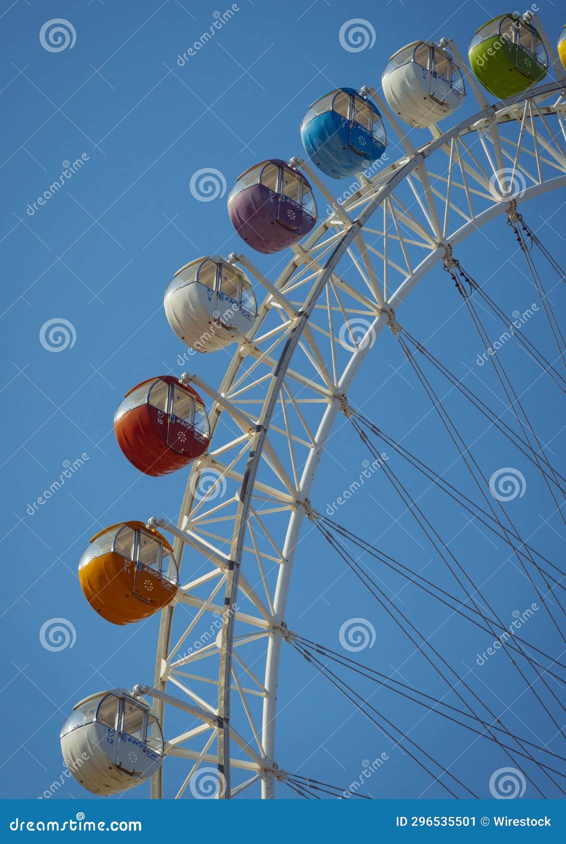 Vibrant Ferris Wheel Comprising Several Multi-colored Spinning Wheels ...