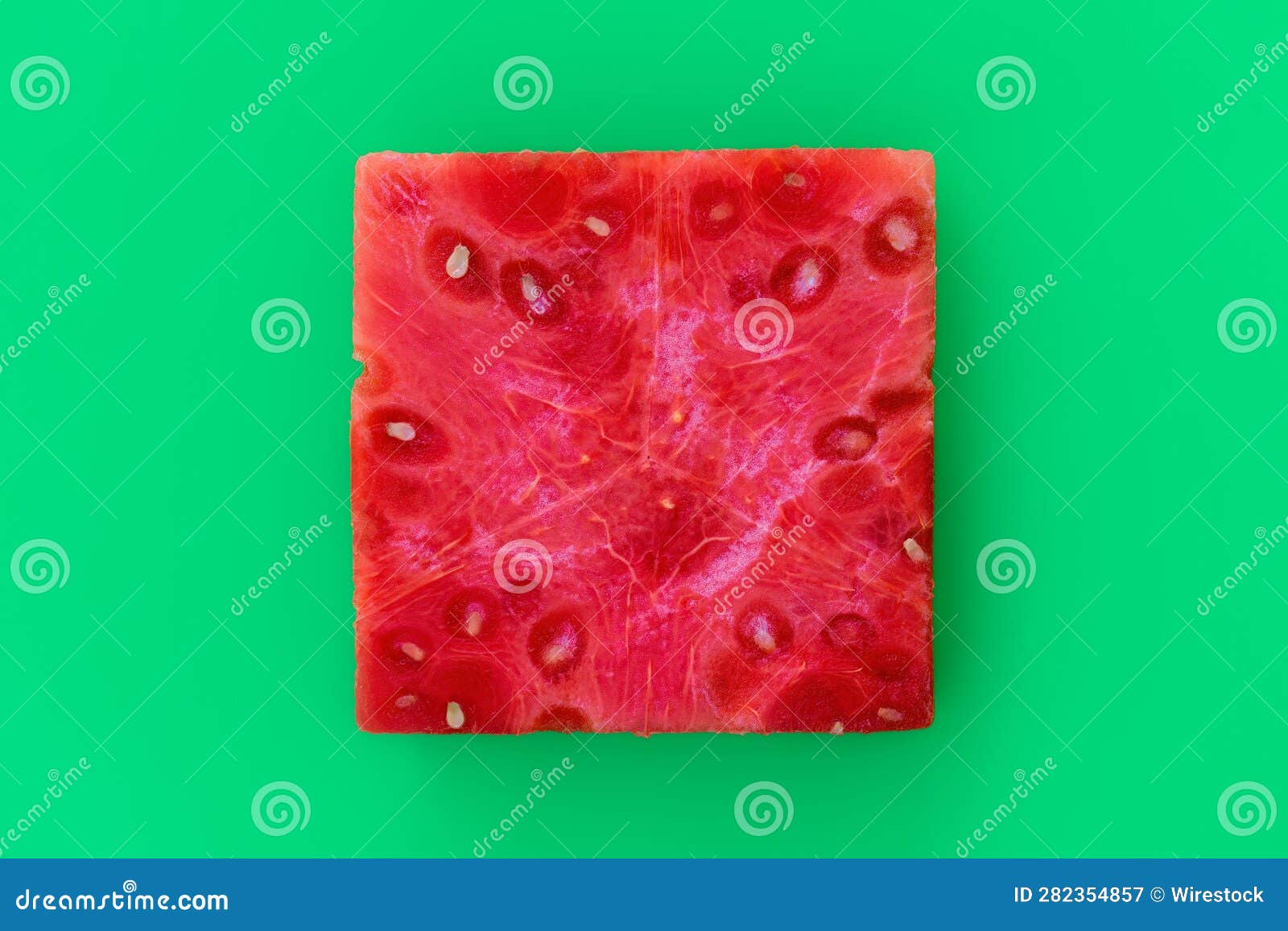 Vibrant, Fresh Watermelon Slice Sitting Atop a Solid Green Surface ...