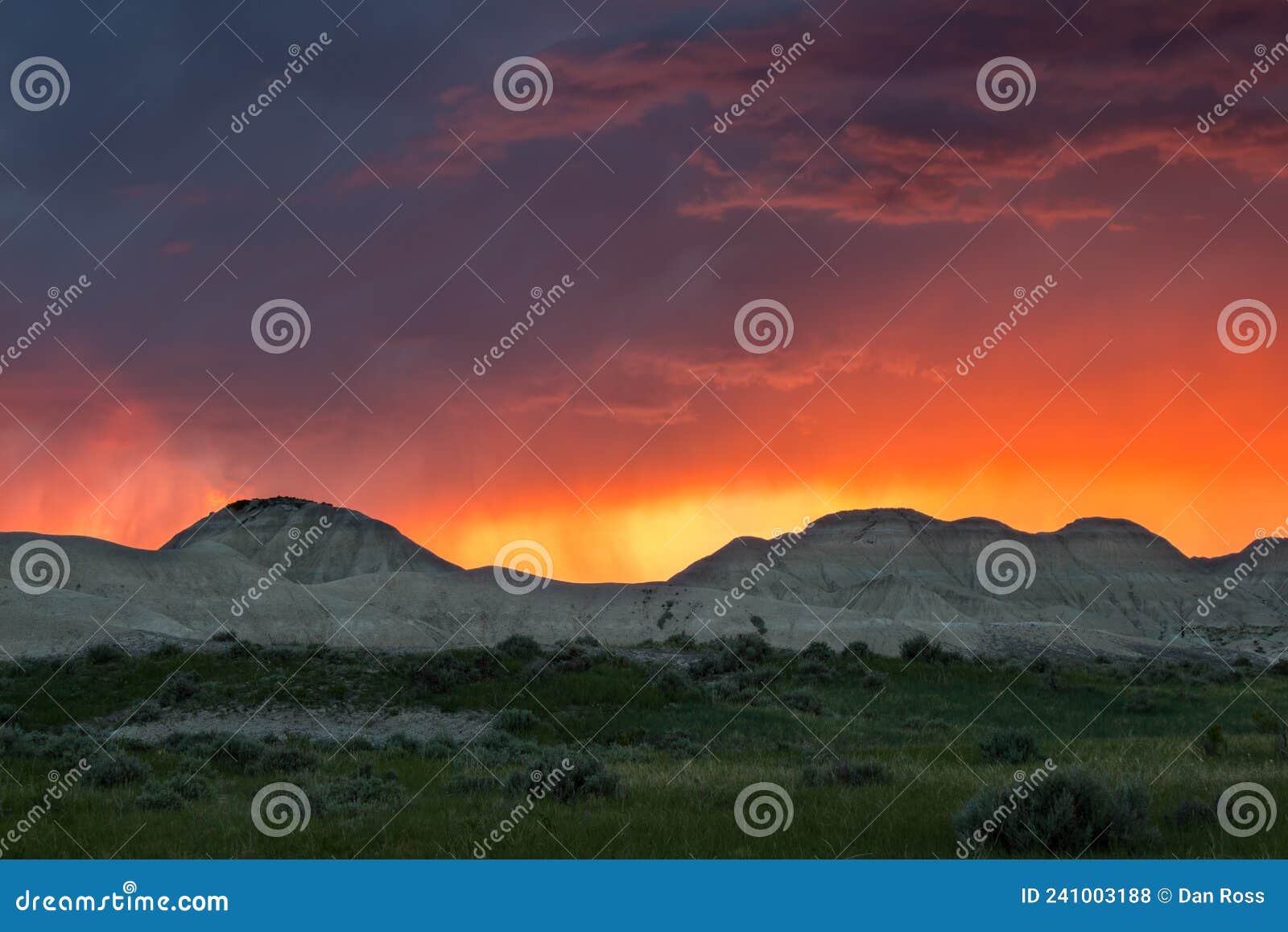A Vibrant, Glowing Sunset Over Badlands in the Great Plains. Stock ...
