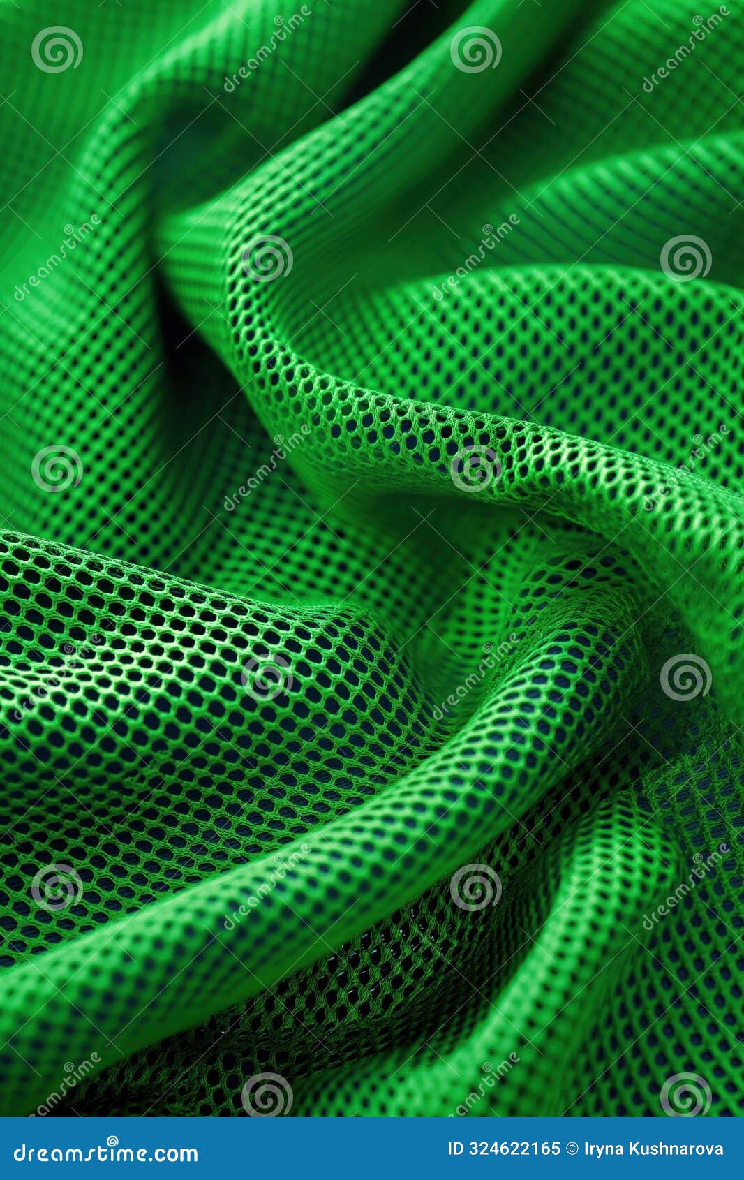 Vibrant Green Fabric with Textured Surface Shows Small Circular Holes ...