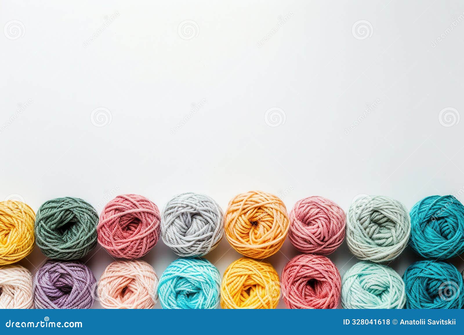 A Vibrant Grid of Colorful Yarn Rolls on a White Background Provides ...