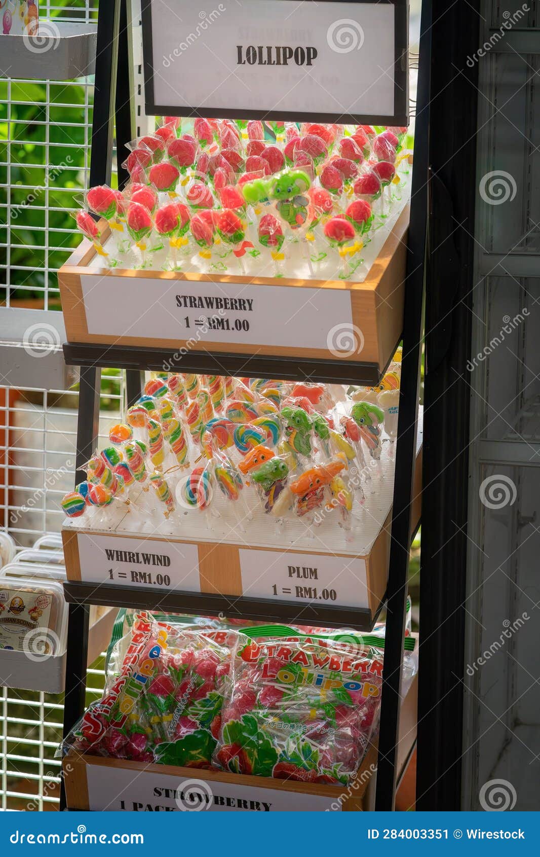 Vibrant Lollipop Stand Filled with Various Hues of Candy Editorial ...