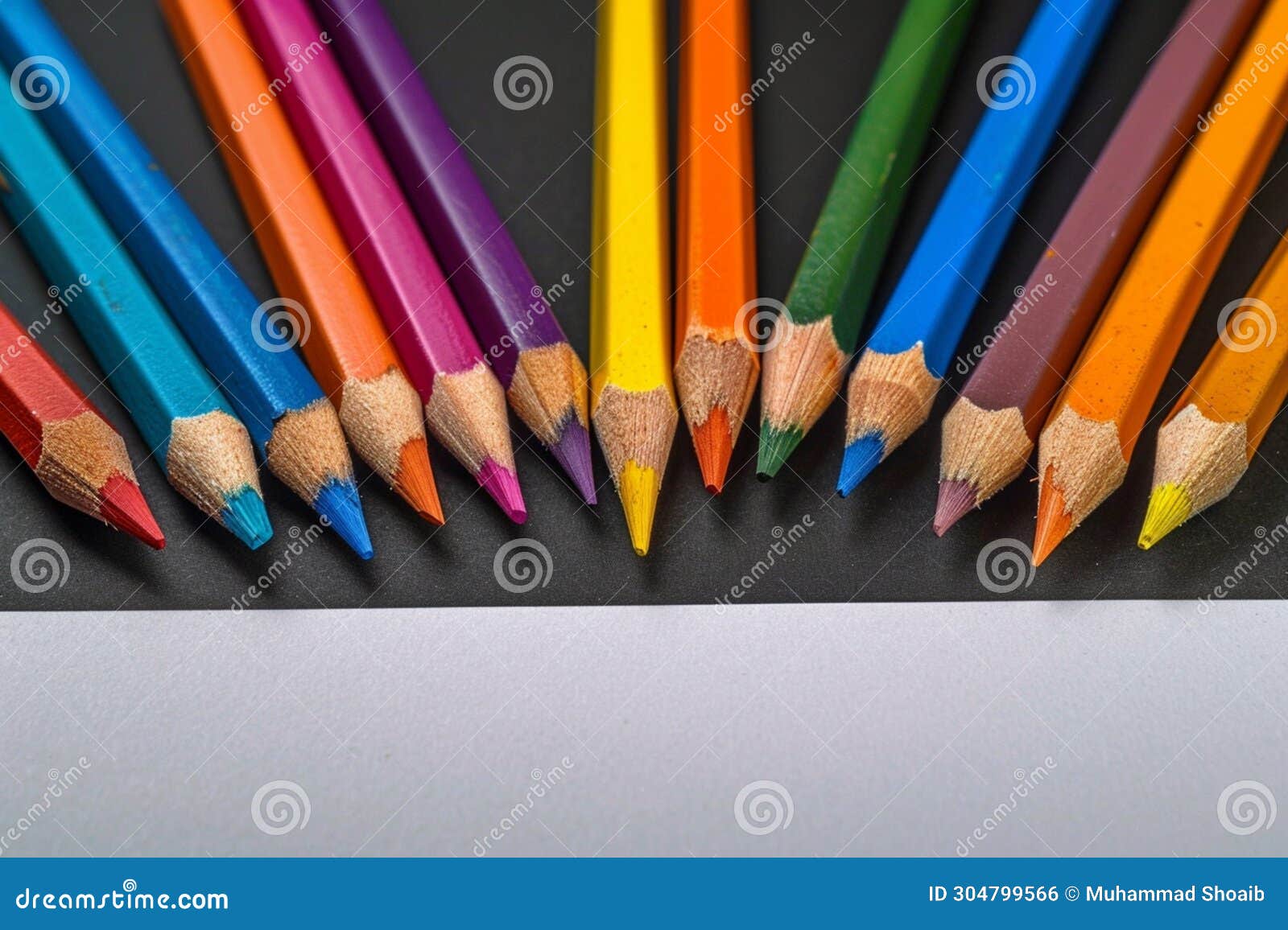 Vibrant Palette Multi Colored Pencils and White Paper on Elegant Black ...