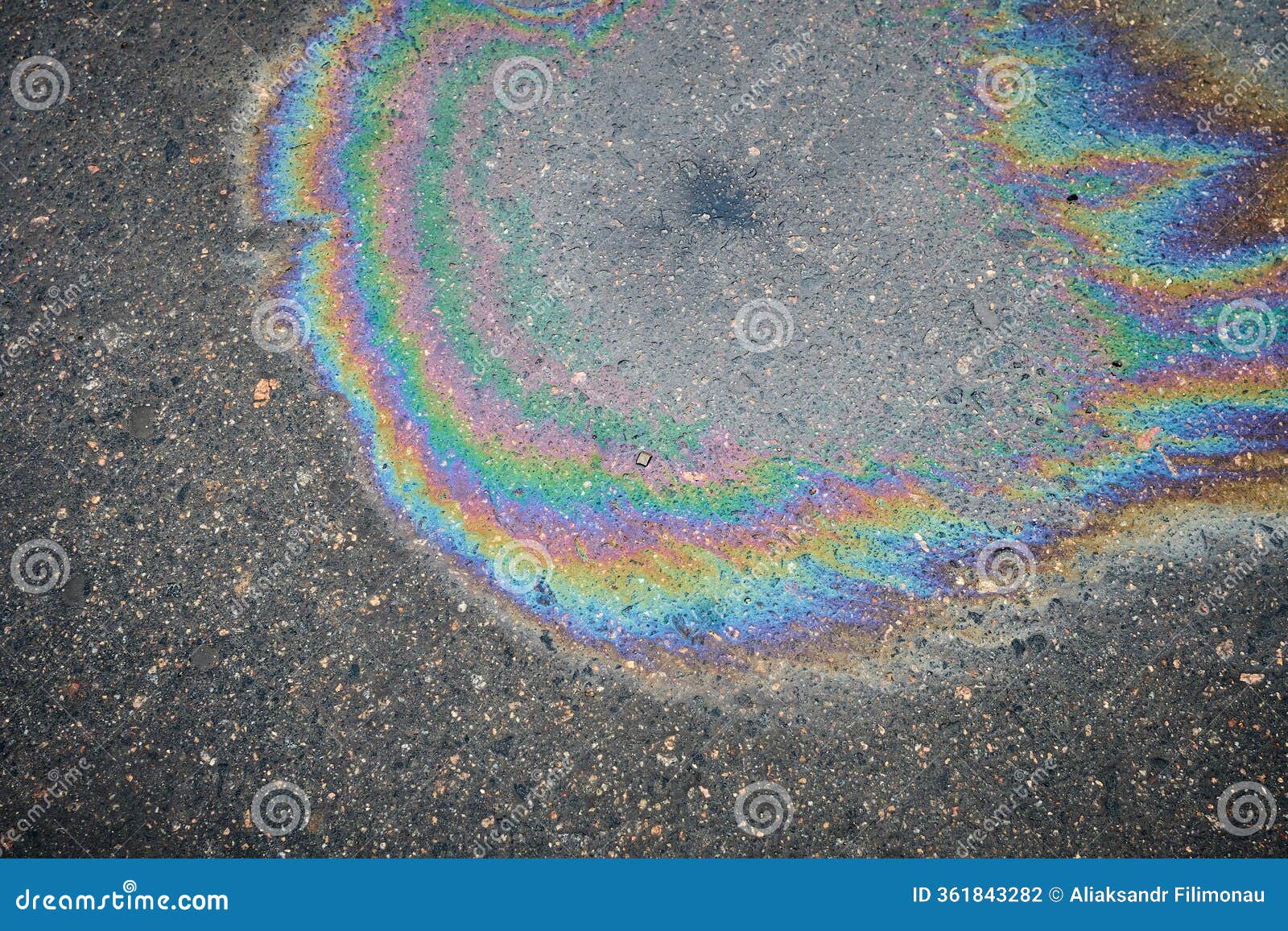Vibrant Rainbow Oil Spill on Wet Pavement. Stock Photo - Image of ...