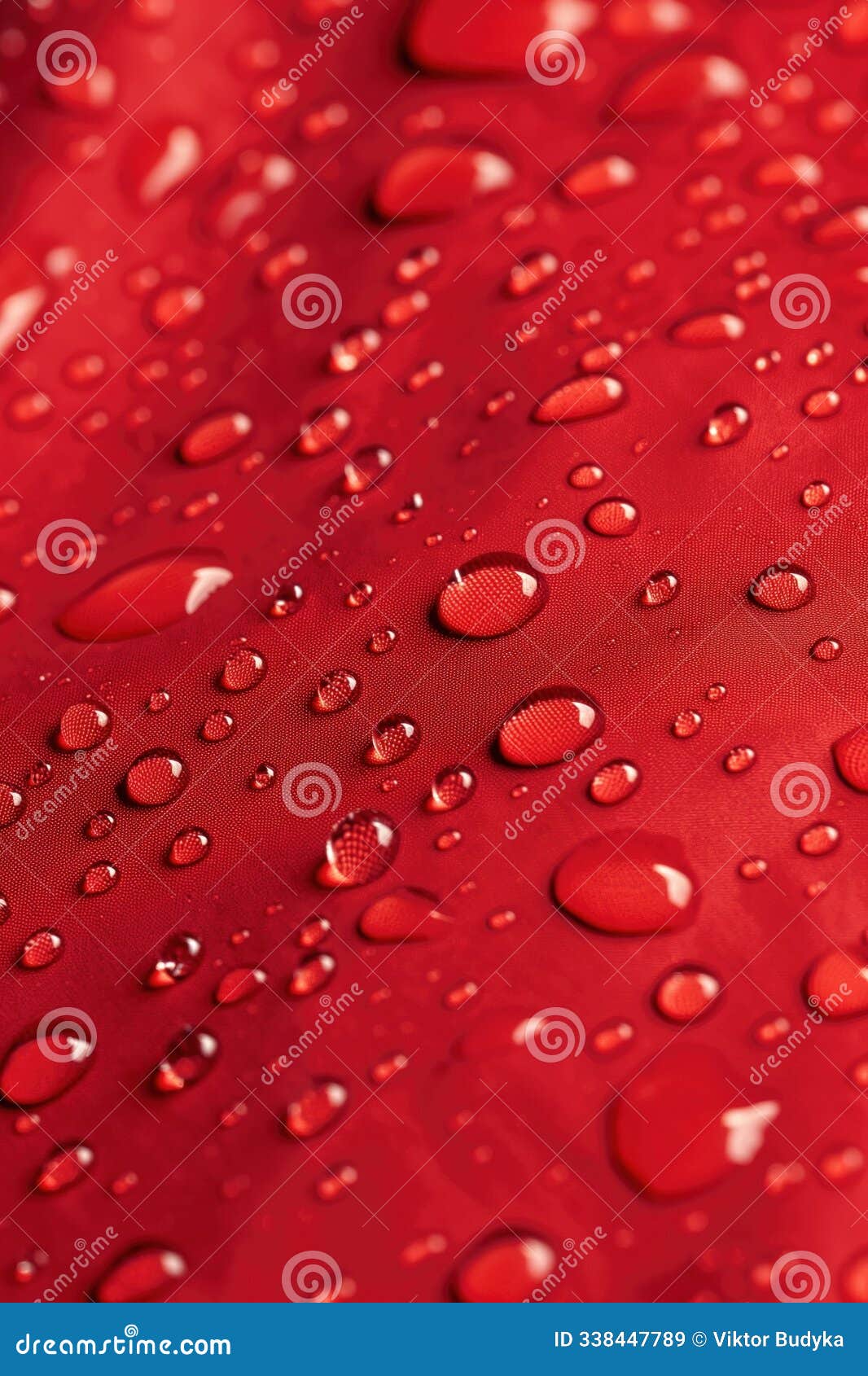 Vibrant Red Fabric with Water Droplets Creates Dynamic Composition ...