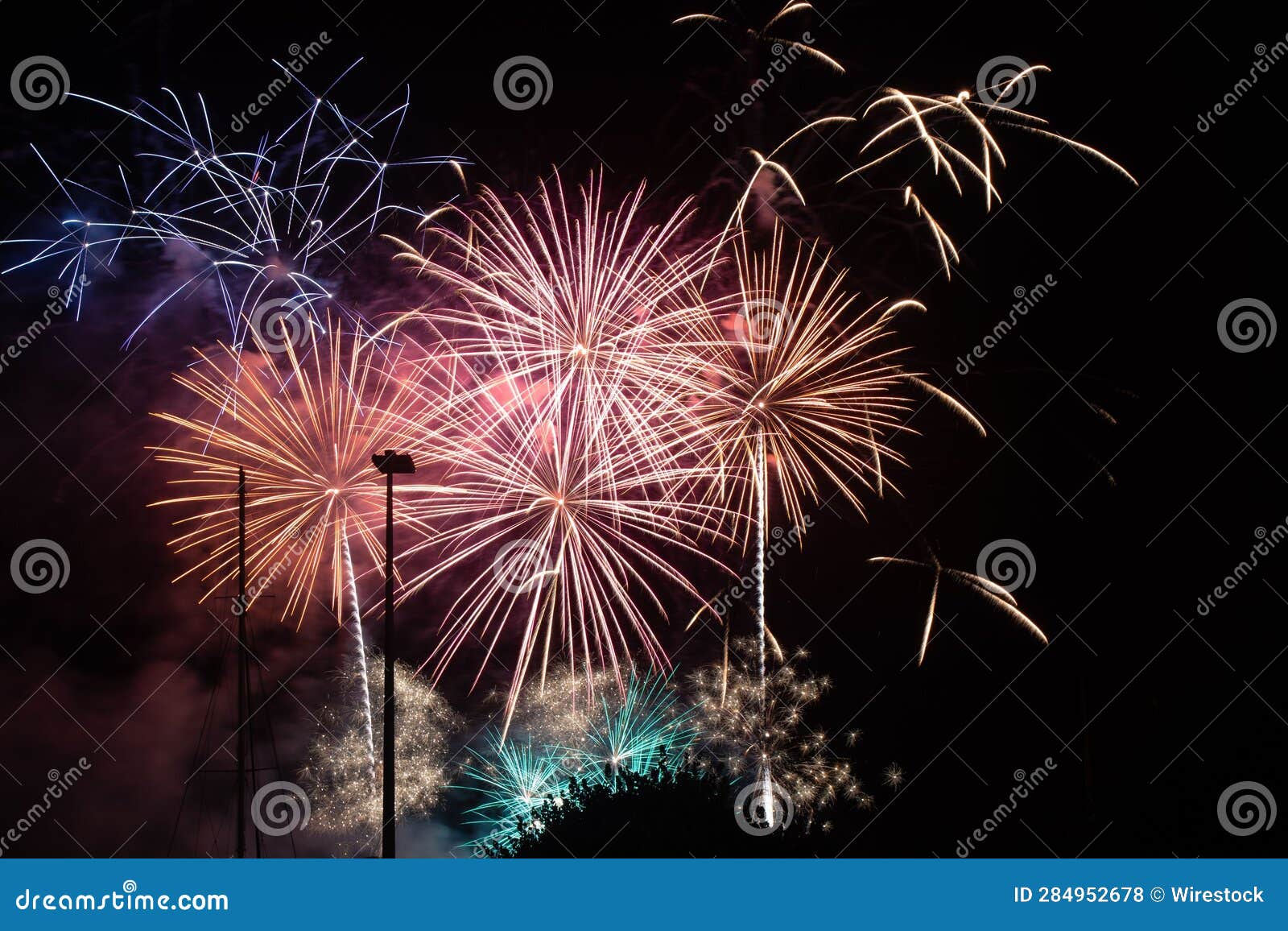 Vibrant View of a Large, Rainbow Firework Display Against a Dark Night ...