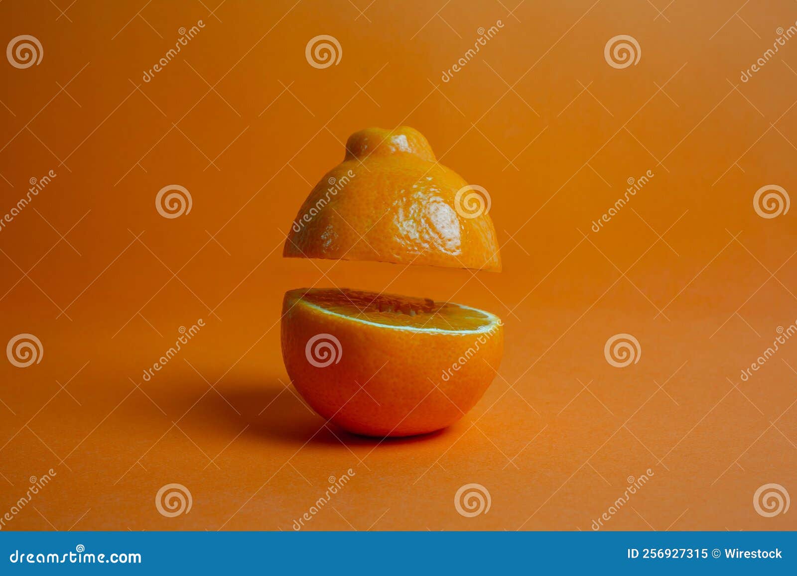 Vibrant Warm Colored Orange Fruit Sliced in Half, Isolated Shot Stock ...