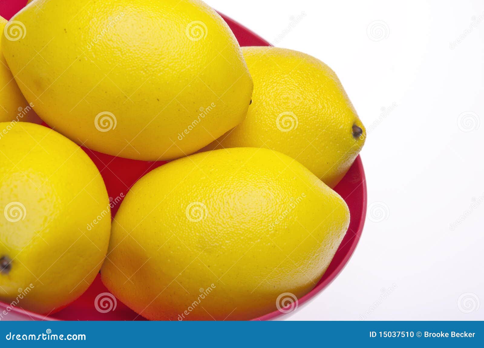 Vibrant Yellow Lemons in a Pink Bowl Stock Photo - Image of magenta ...